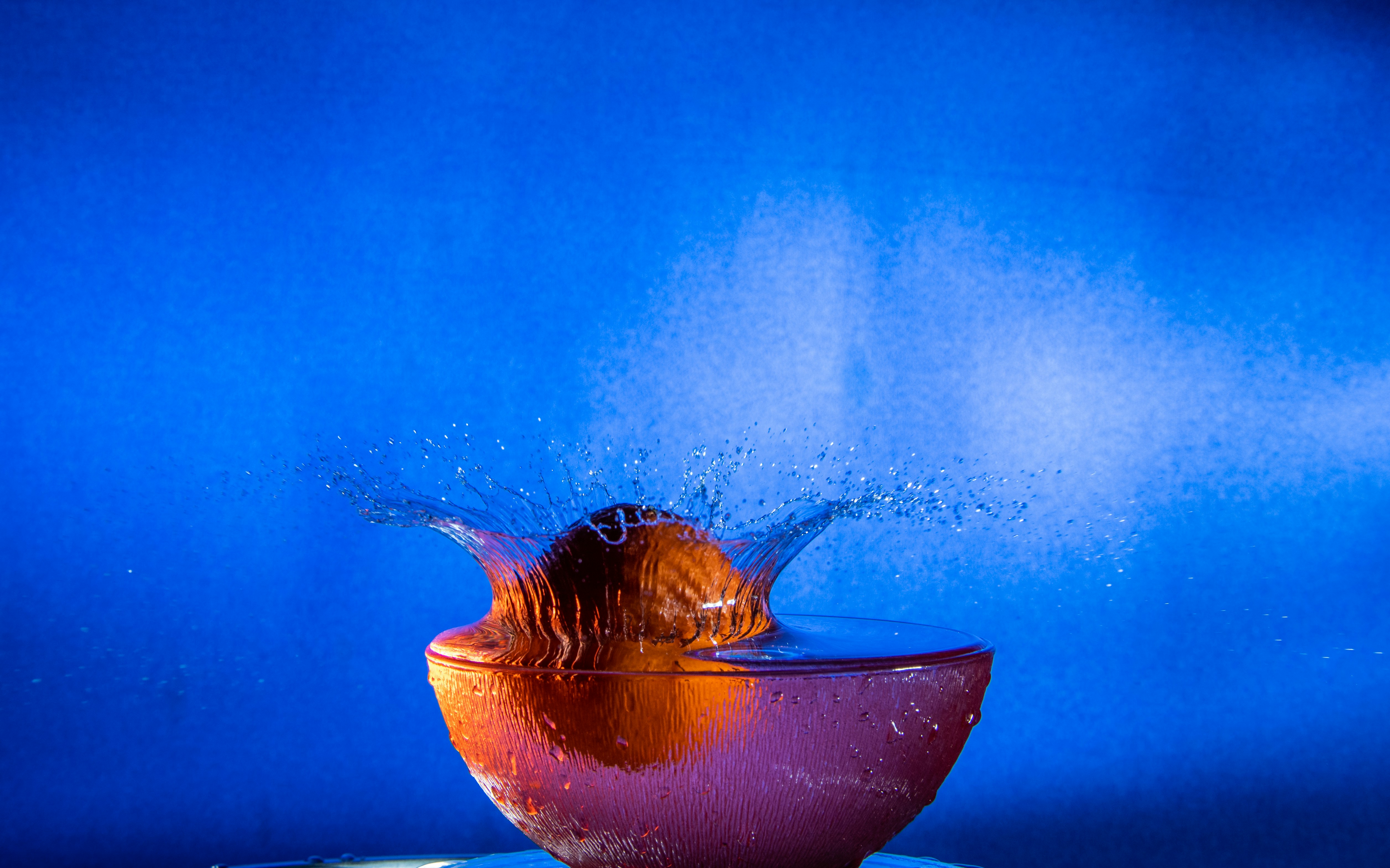 An object is splashing into a bowl of liquid. photo – Free Food Image ...