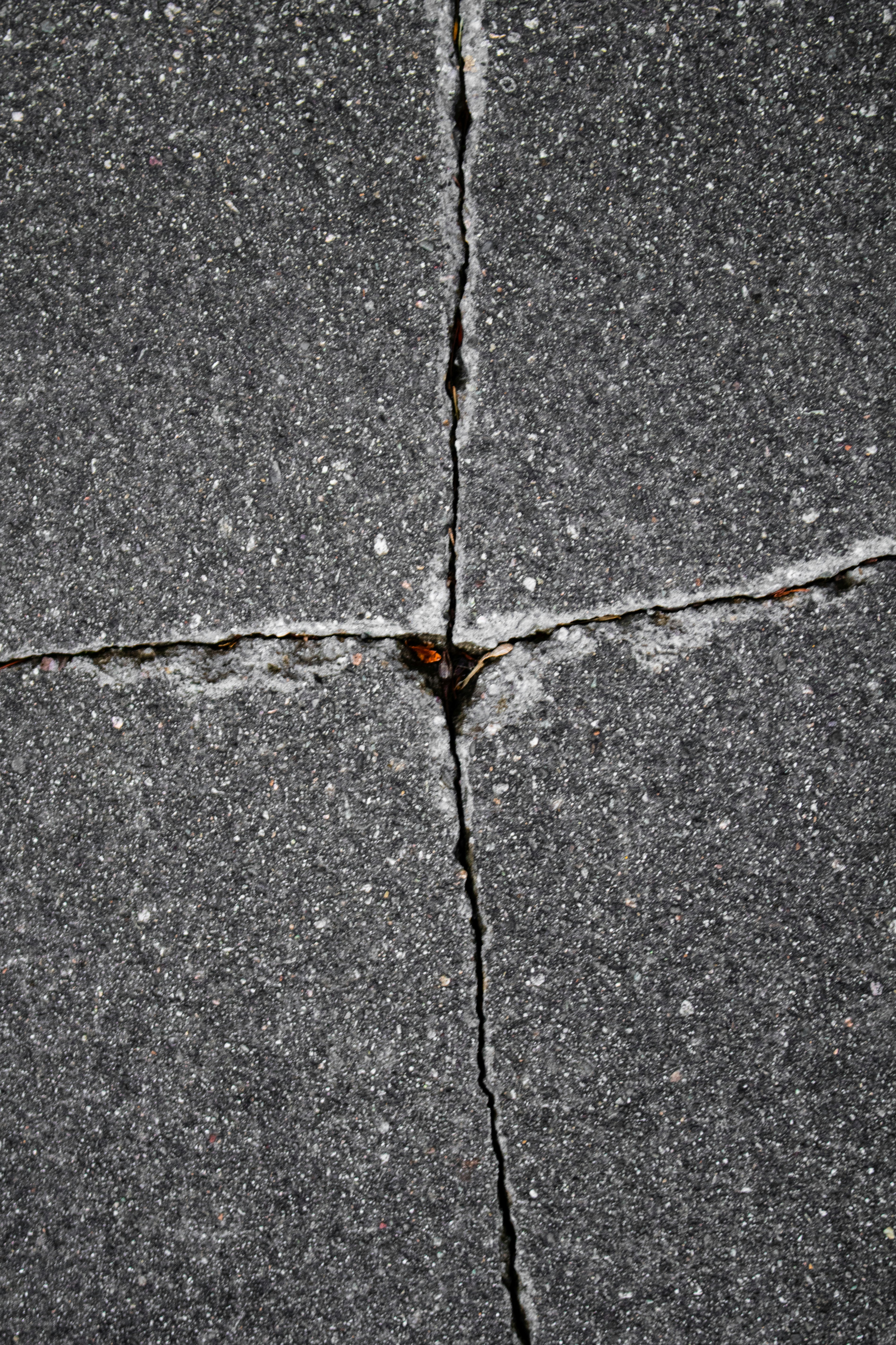 Crossroads in Concrete: A Macro Study of Weathered Pavement Cracks