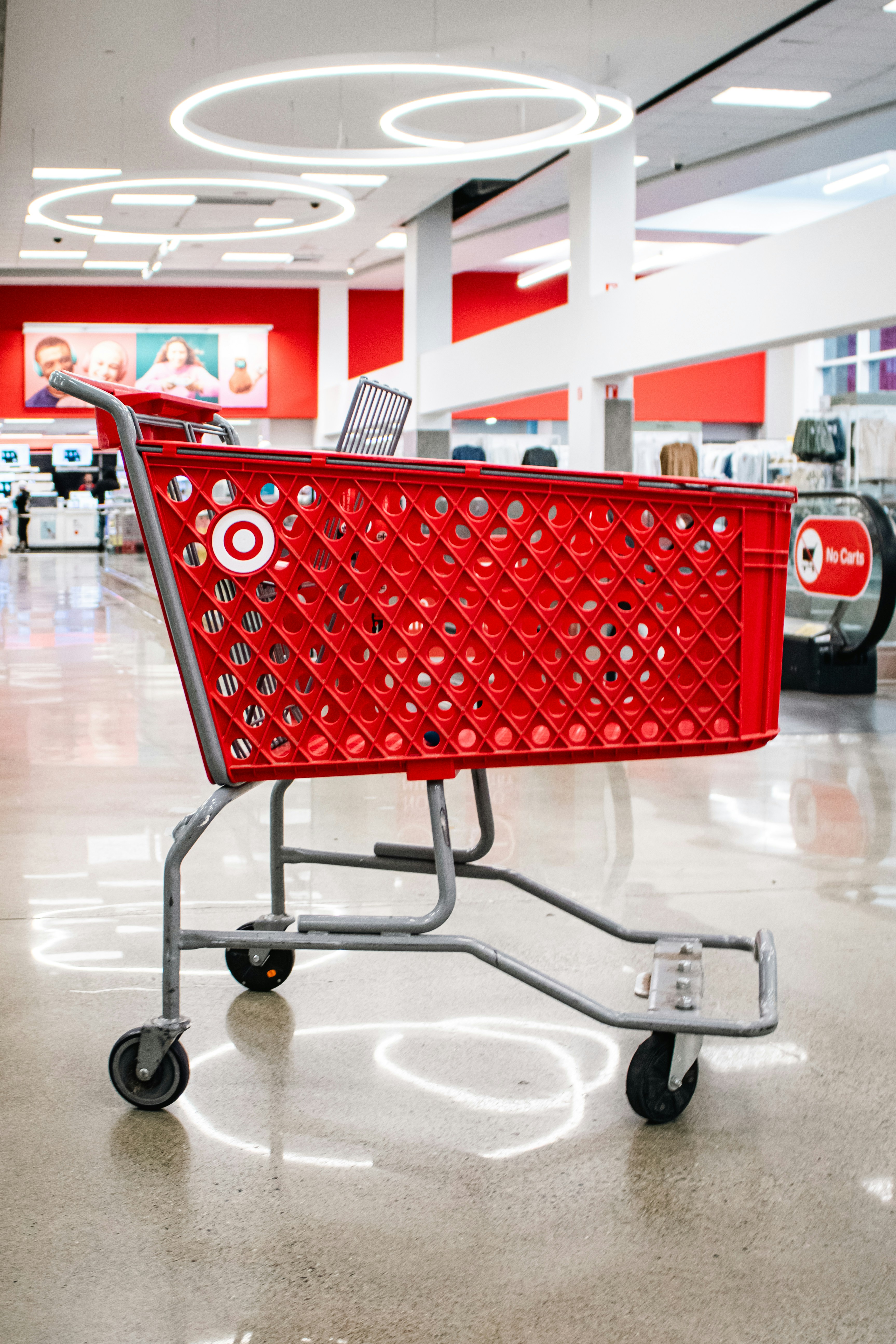 Red target shopping cart inside a store. photo – Free Interior Image on ...
