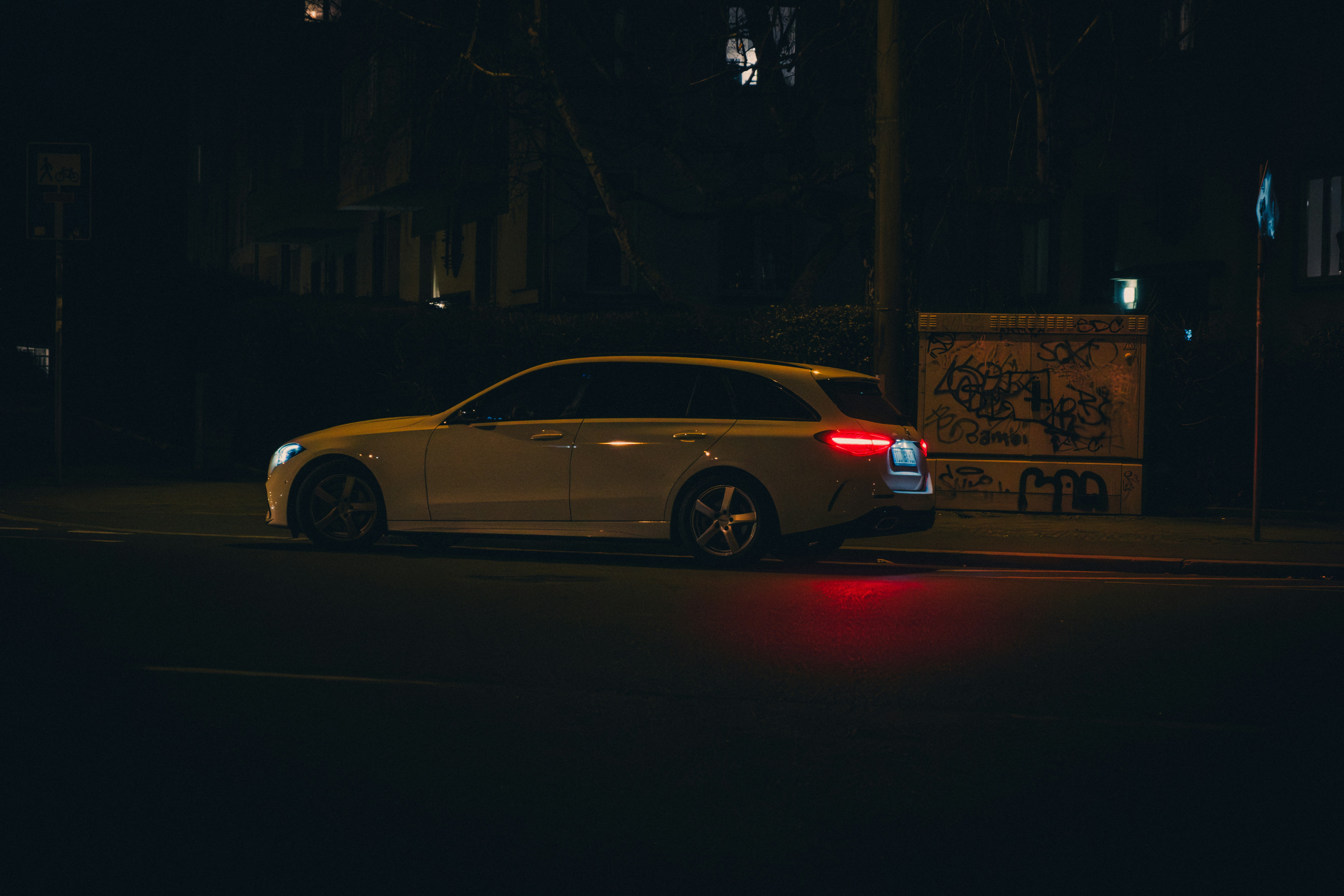 Midnight Sedan: A Quiet Neon Secret on a Silent Street