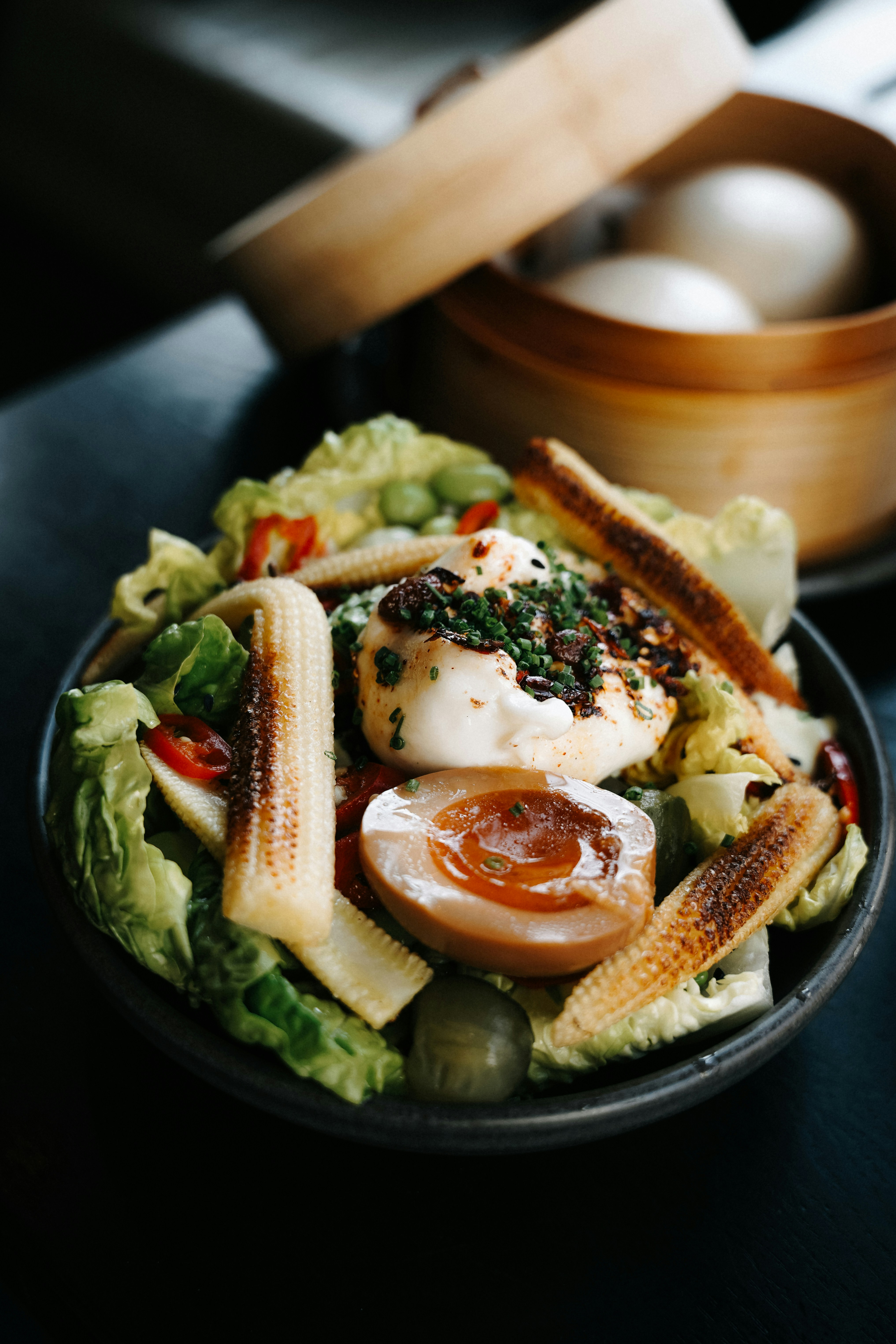 Vibrant Bowl of Greens with Toasted Torches and a Soft-Boiled Egg