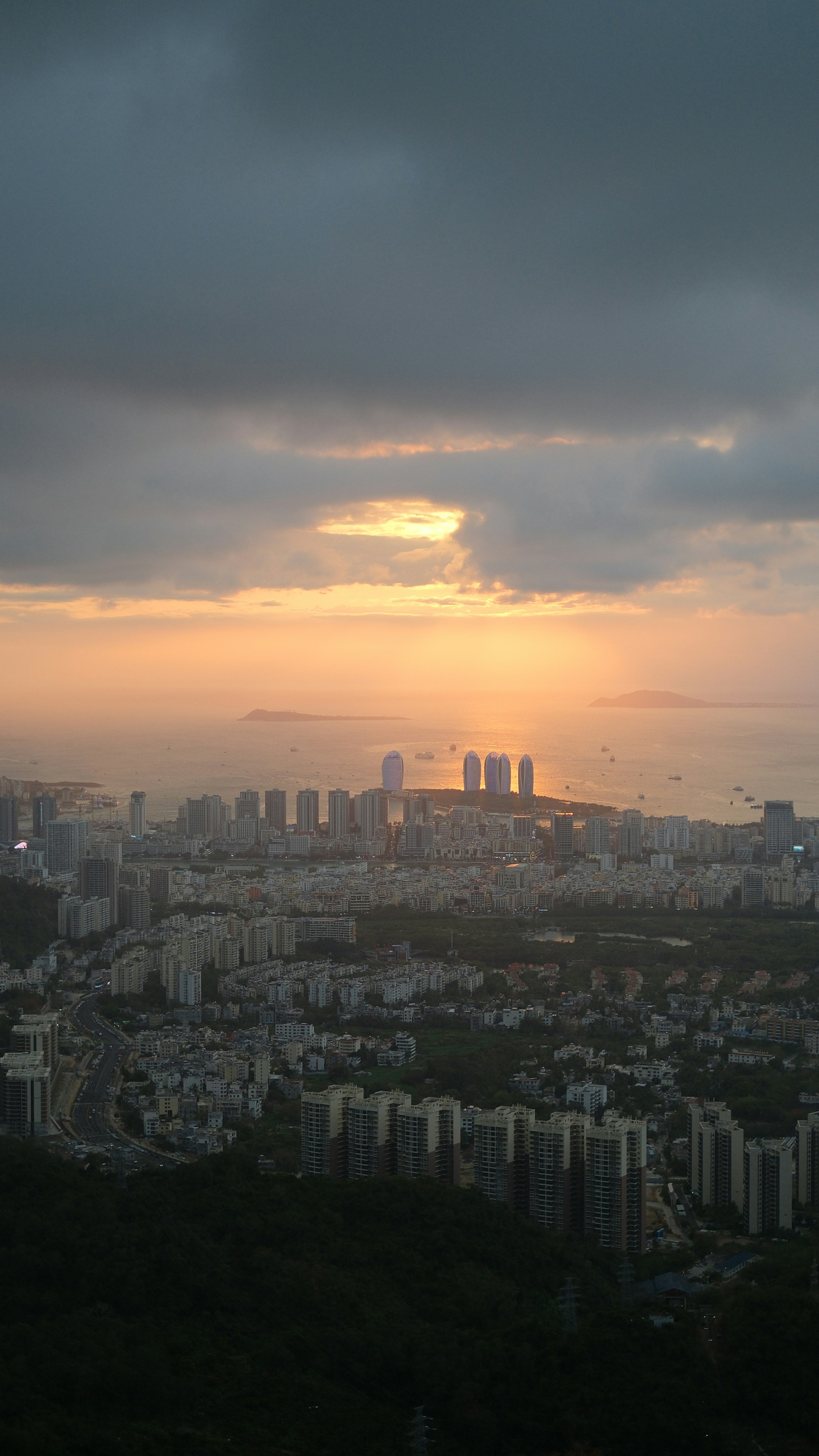 Horizon Fire: Sunset Illuminates a Coastal City of Glass Towers