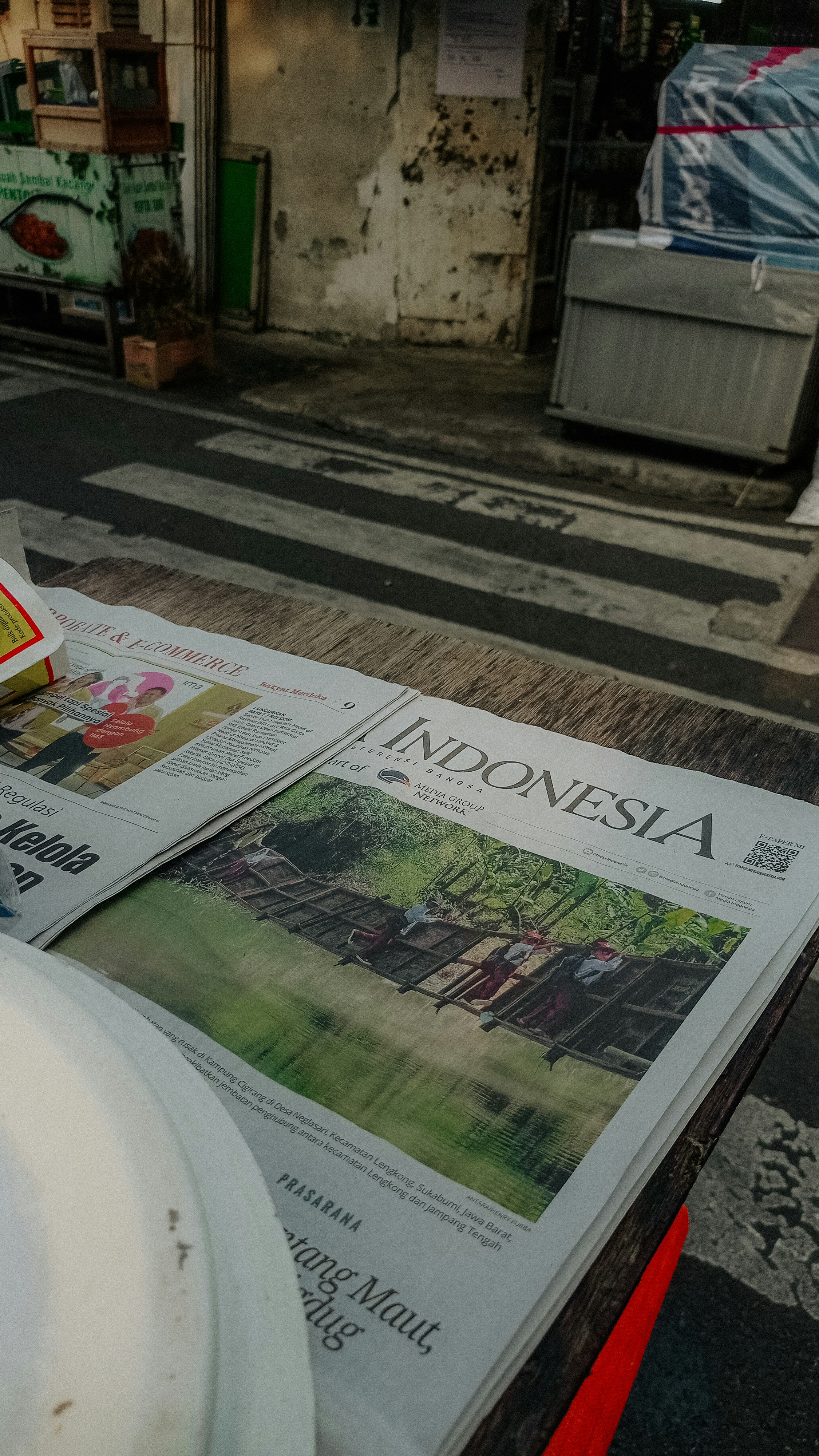 Newspaper, "indonesia," open and on display outdoors. photo – Free ...