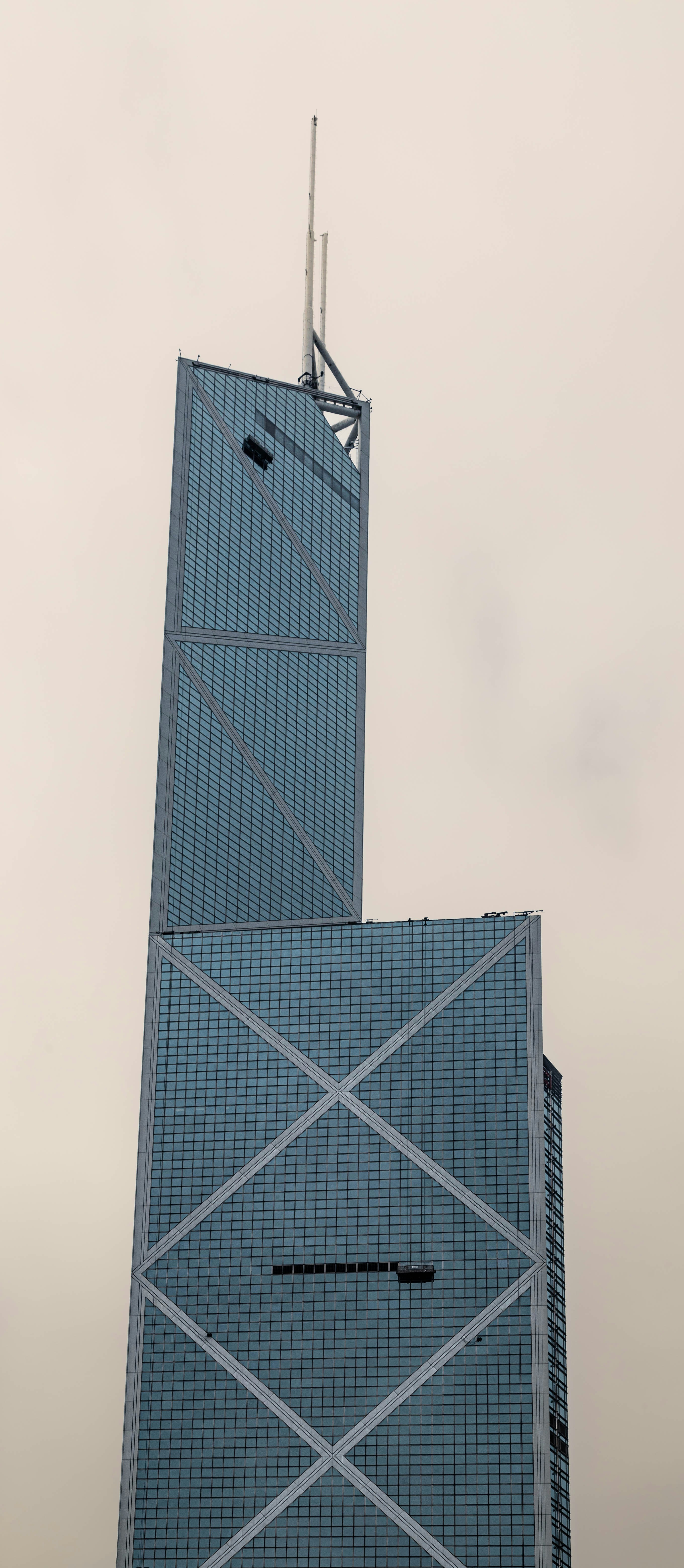Crisscrossed Glass Ascension: a Diamond-Frame Skyscraper Reaches Skyward