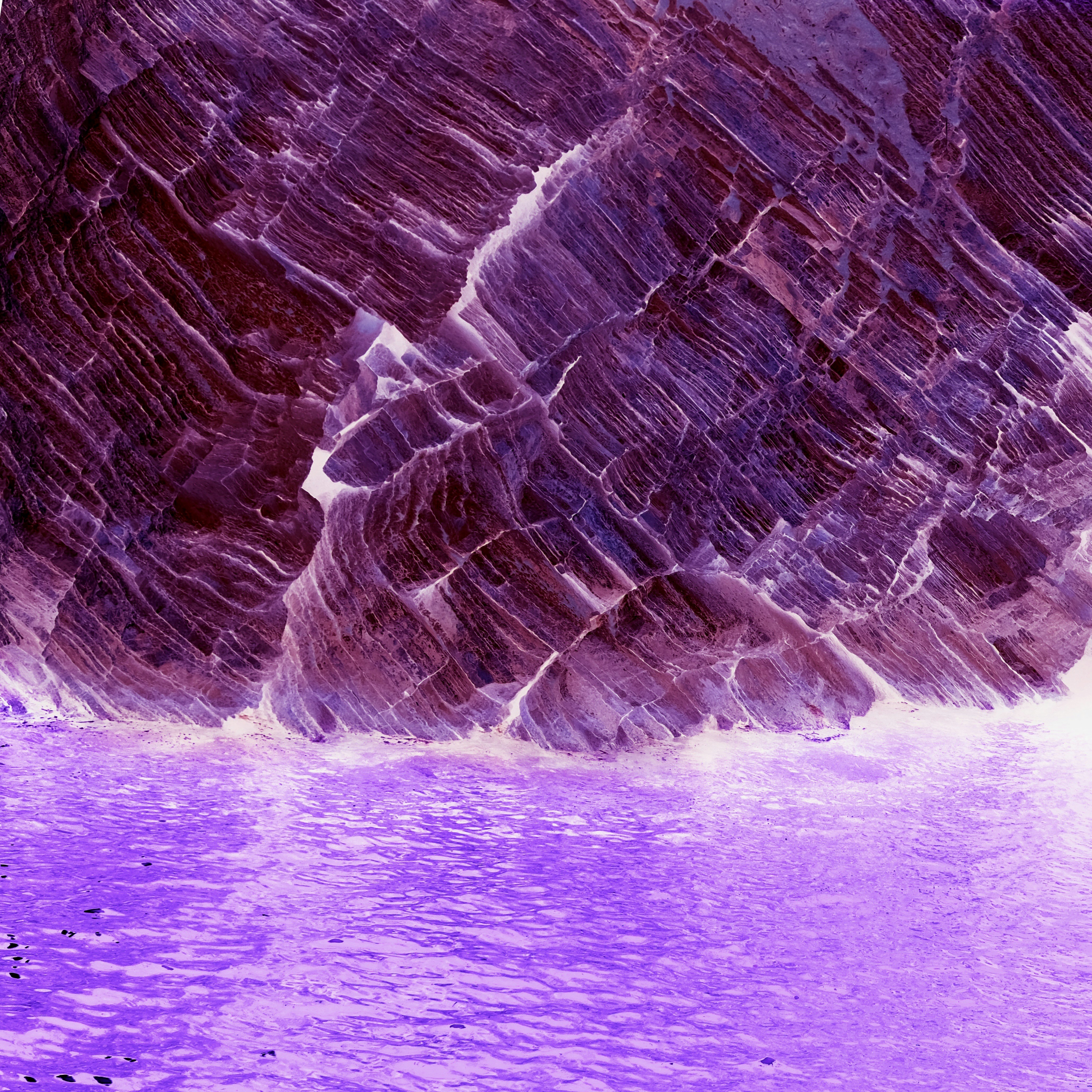 Magenta Strata by the Sea: A Quiet Coastal Rockscape