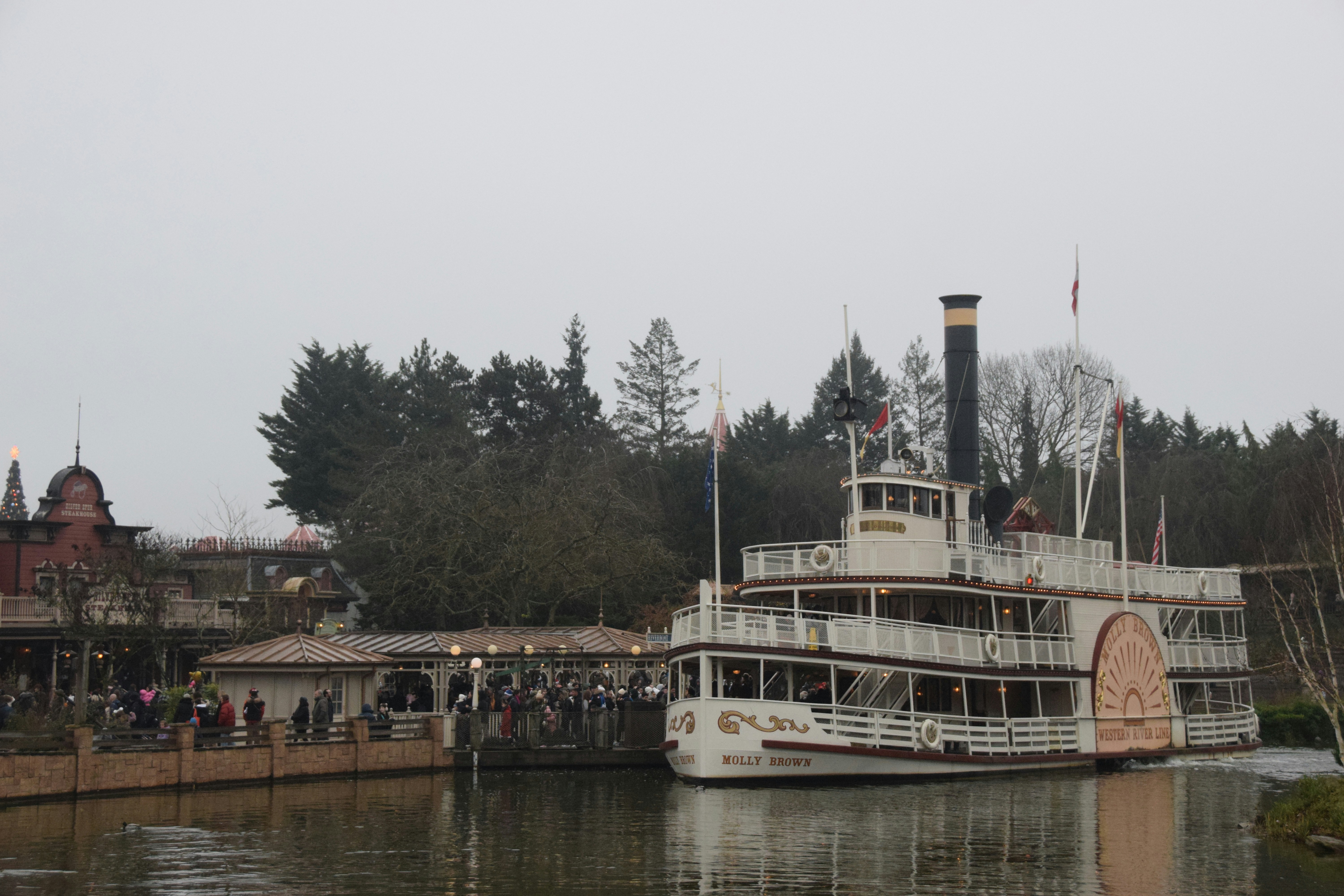 Quaybound Steamship: A Vintage Paddle Steamer Resting by the Riverside Quay
