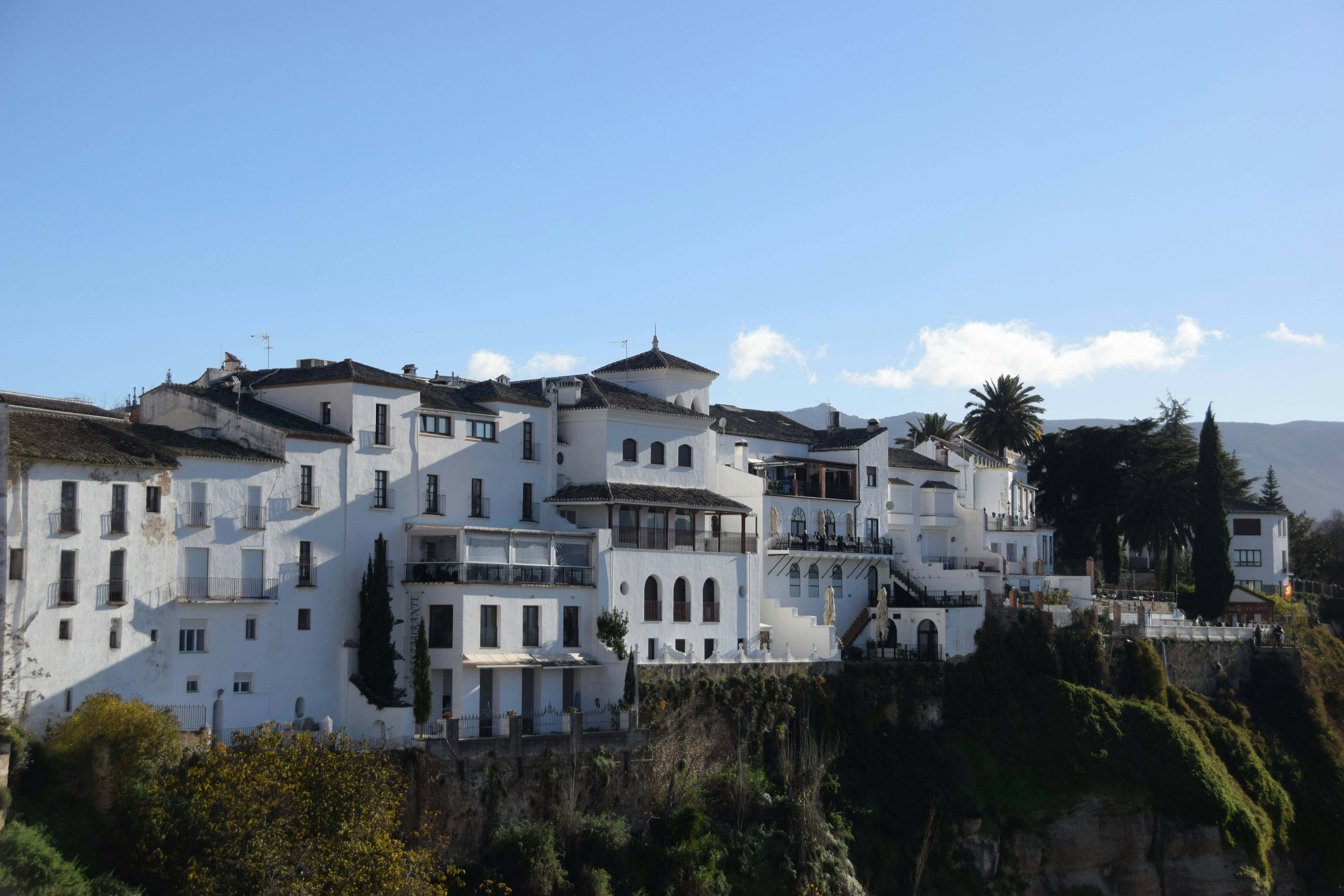 White Village on a Cliff: Sunlit Andalusian Houses