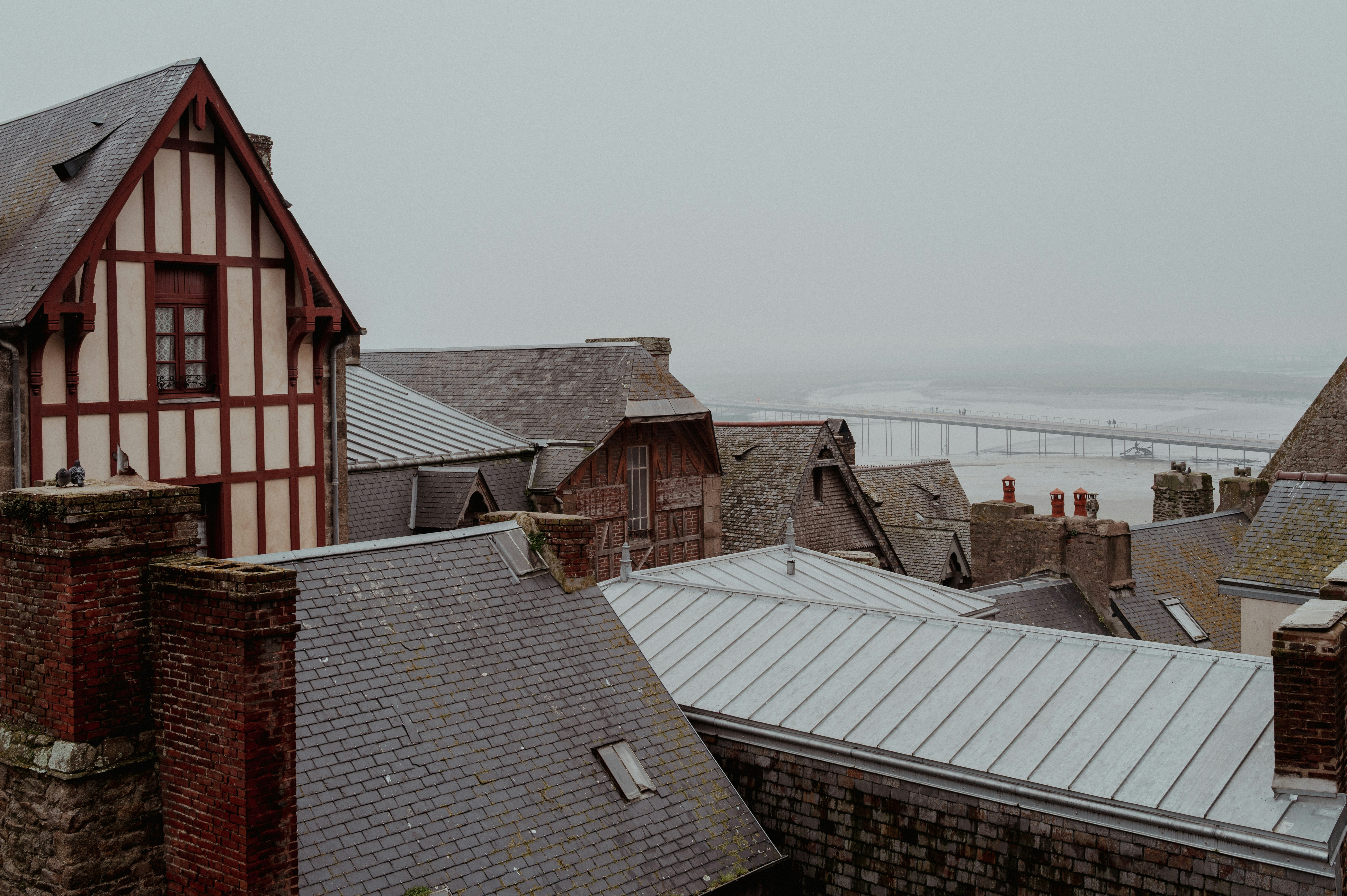 Misty Rooftops of a Coastal Village