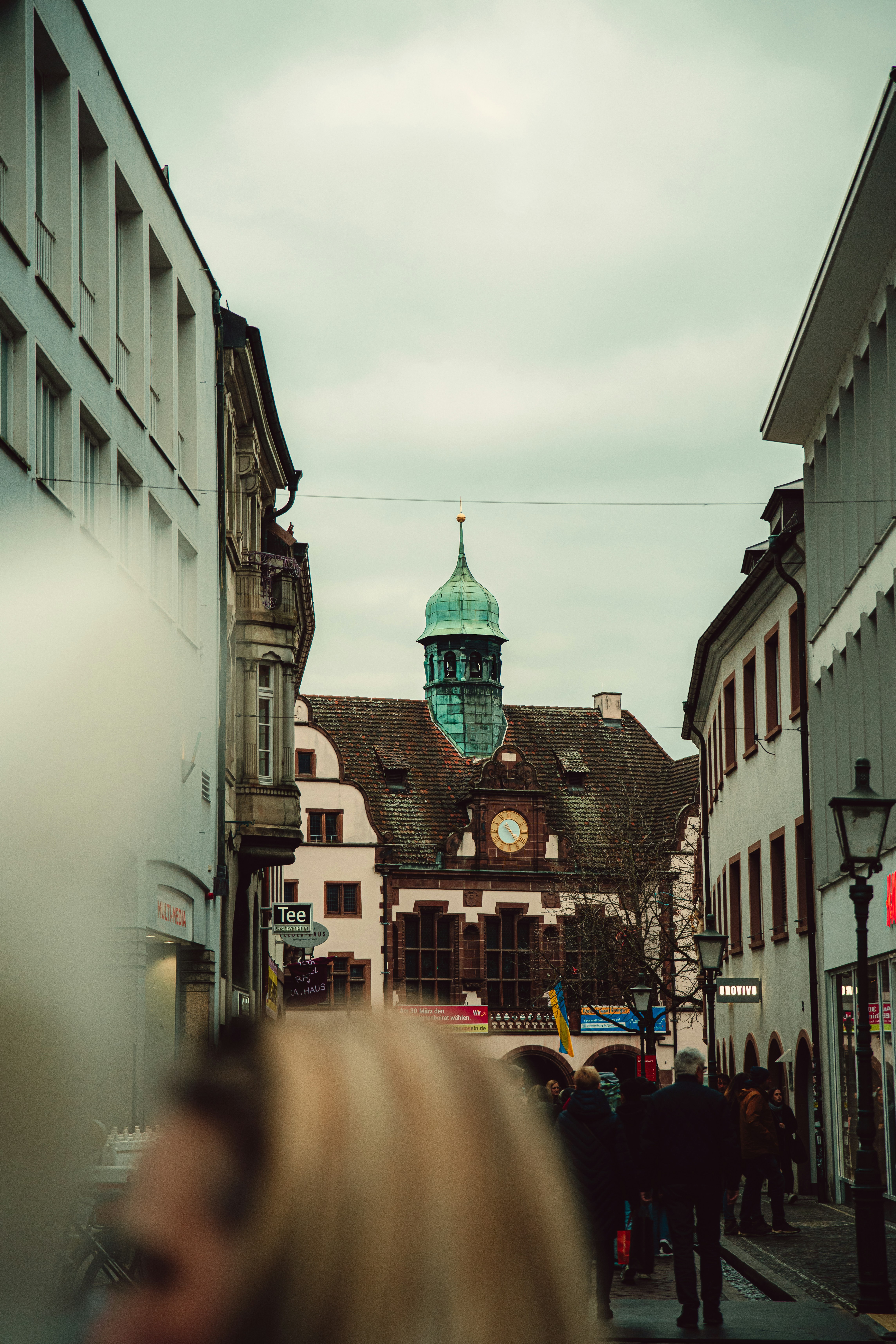 Historic european buildings line a street. photo – Free Portrait Image ...