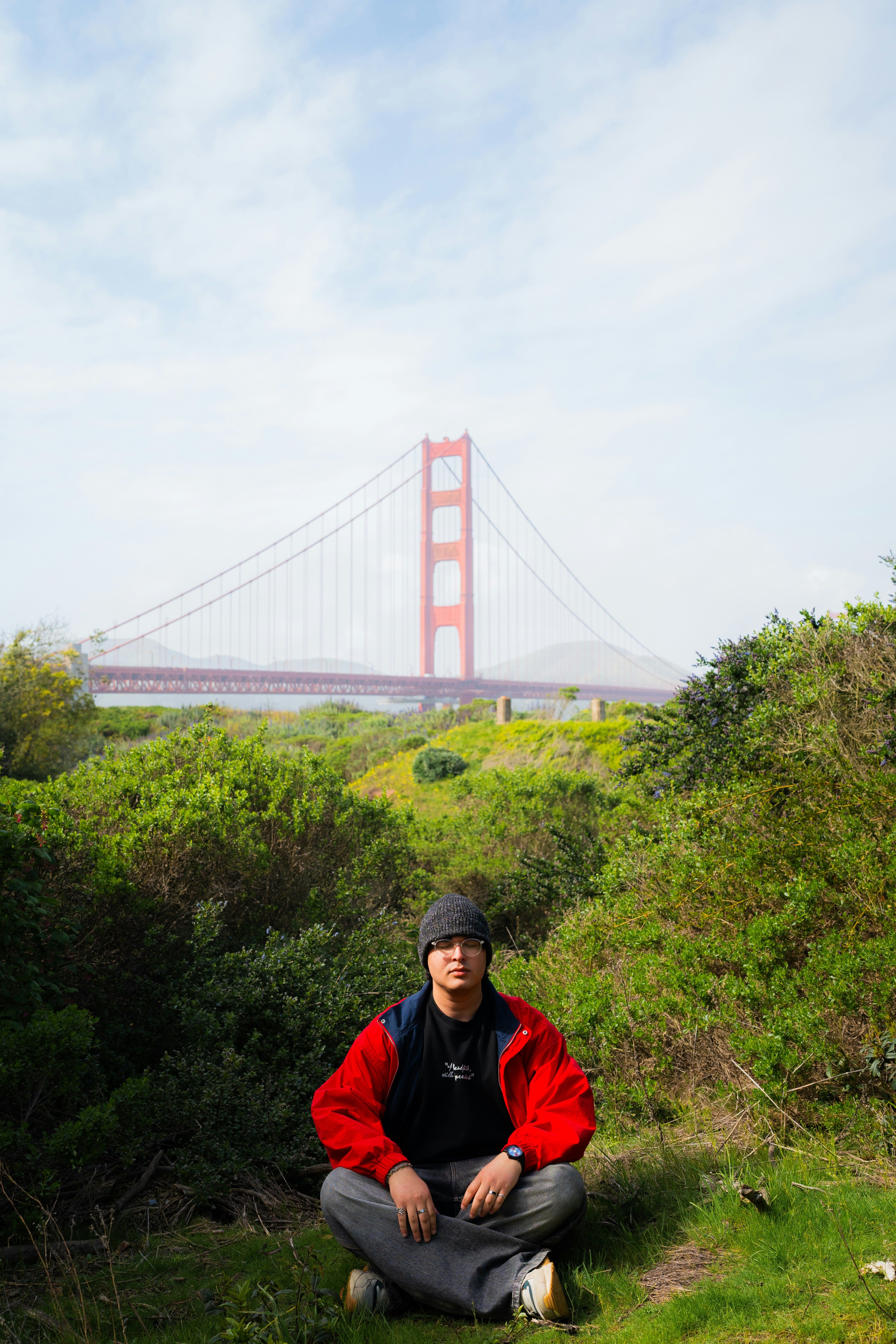 Man poses in front of the golden gate bridge. photo – Free Fashion ...