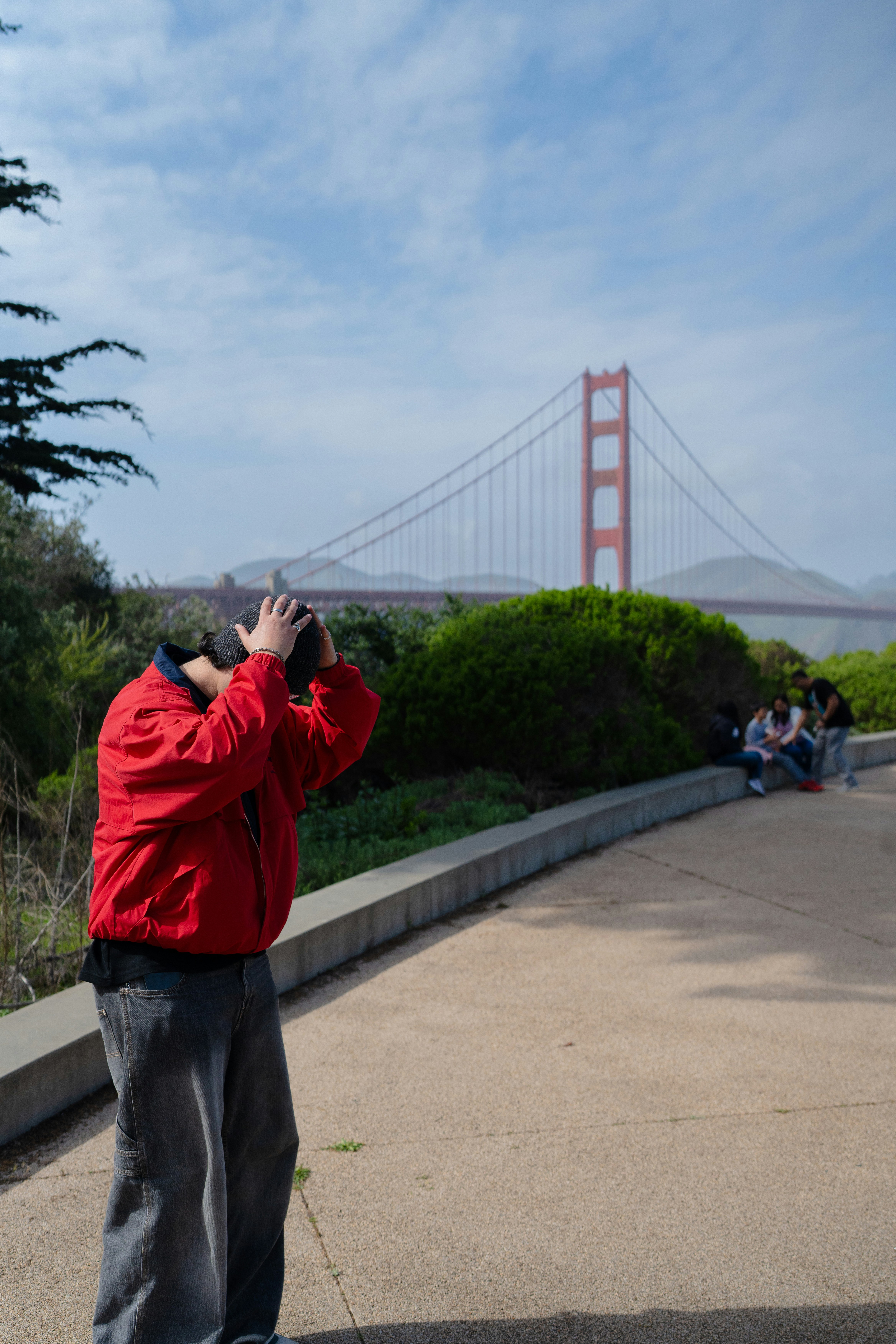 Red Jacket Photographer at the Golden Gate Vista