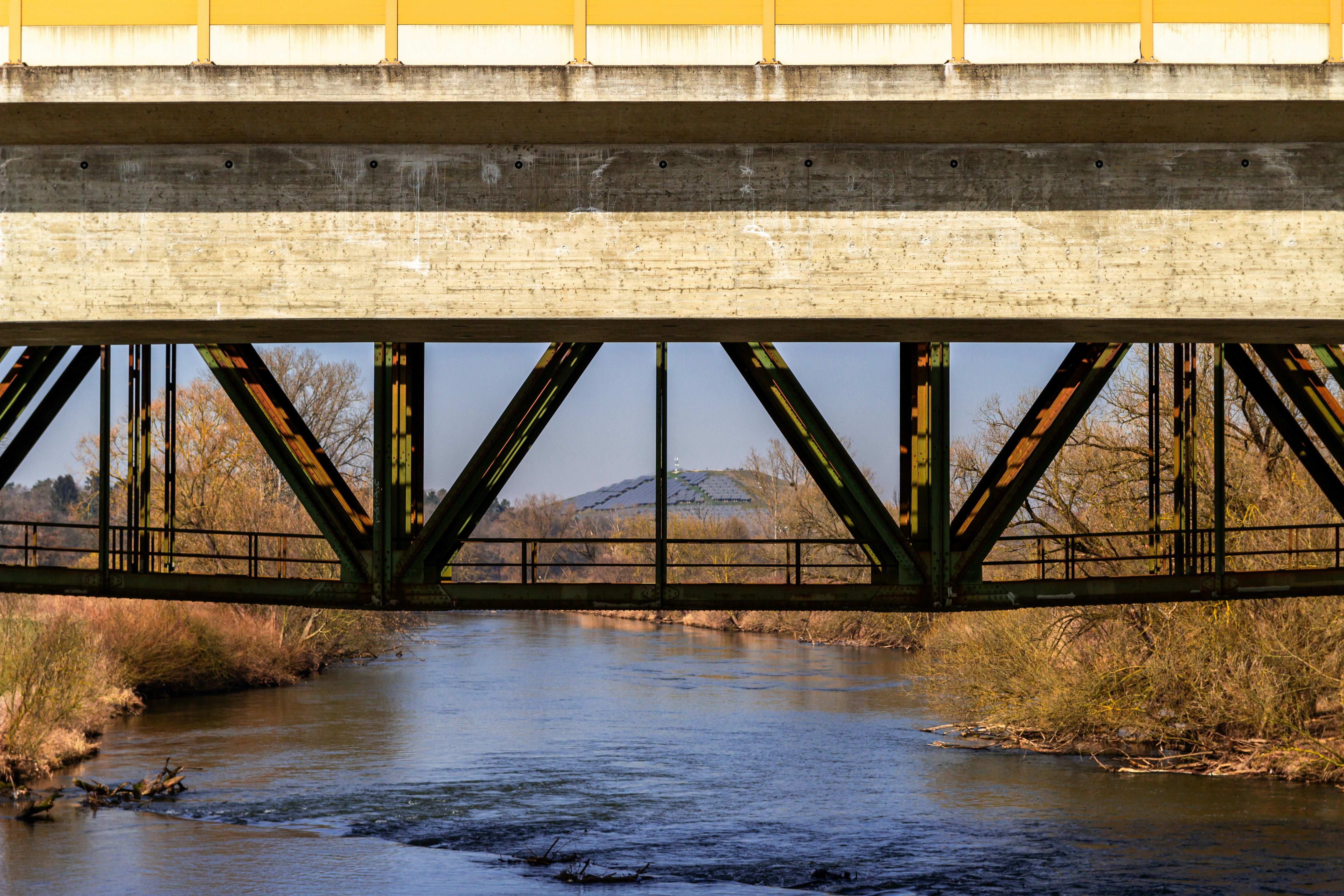 Bridges span over a river, framing a view. photo – Free Wallpaper Image ...