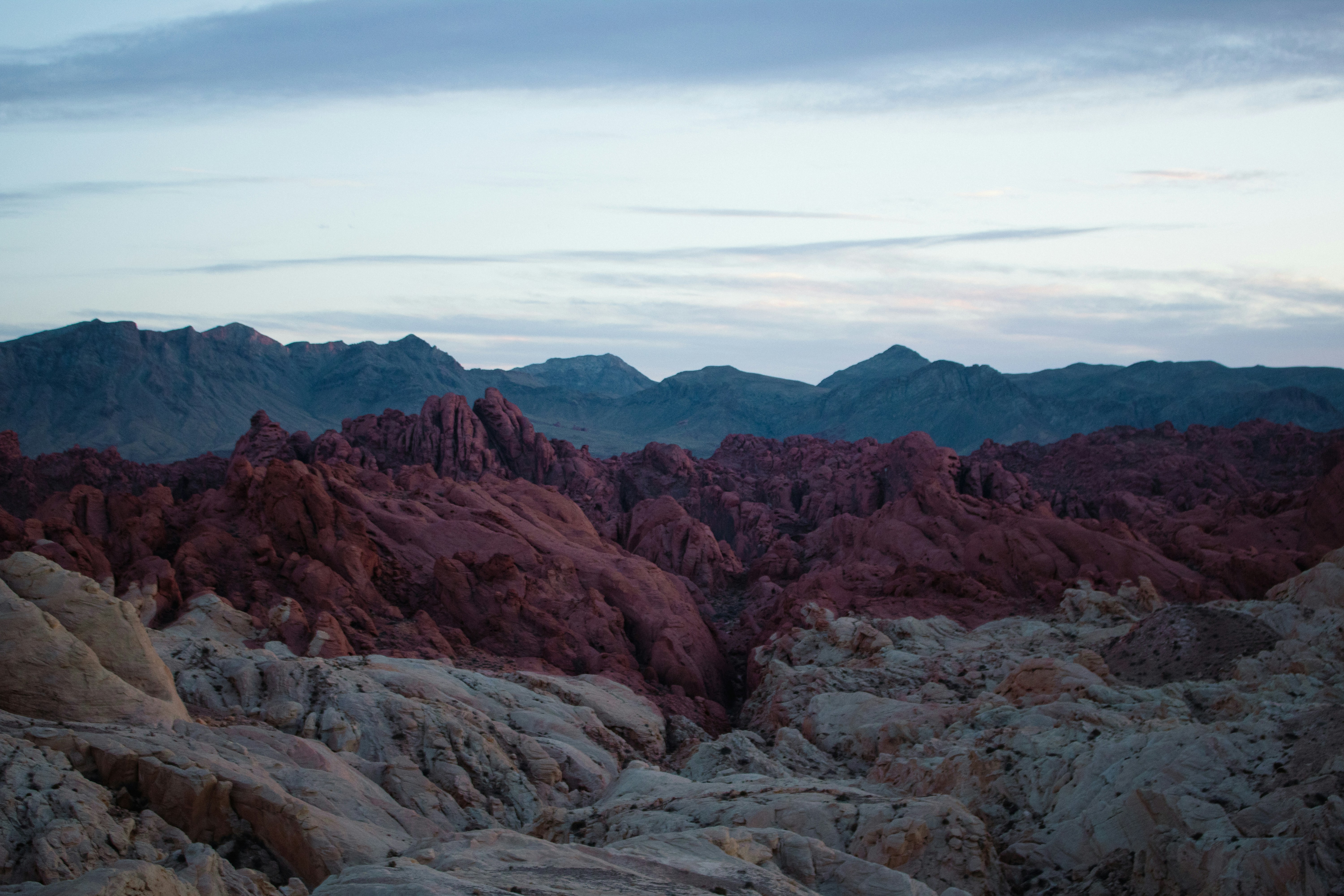 Red rock formations under a dusky sky. photo – Free Wallpaper Image on ...