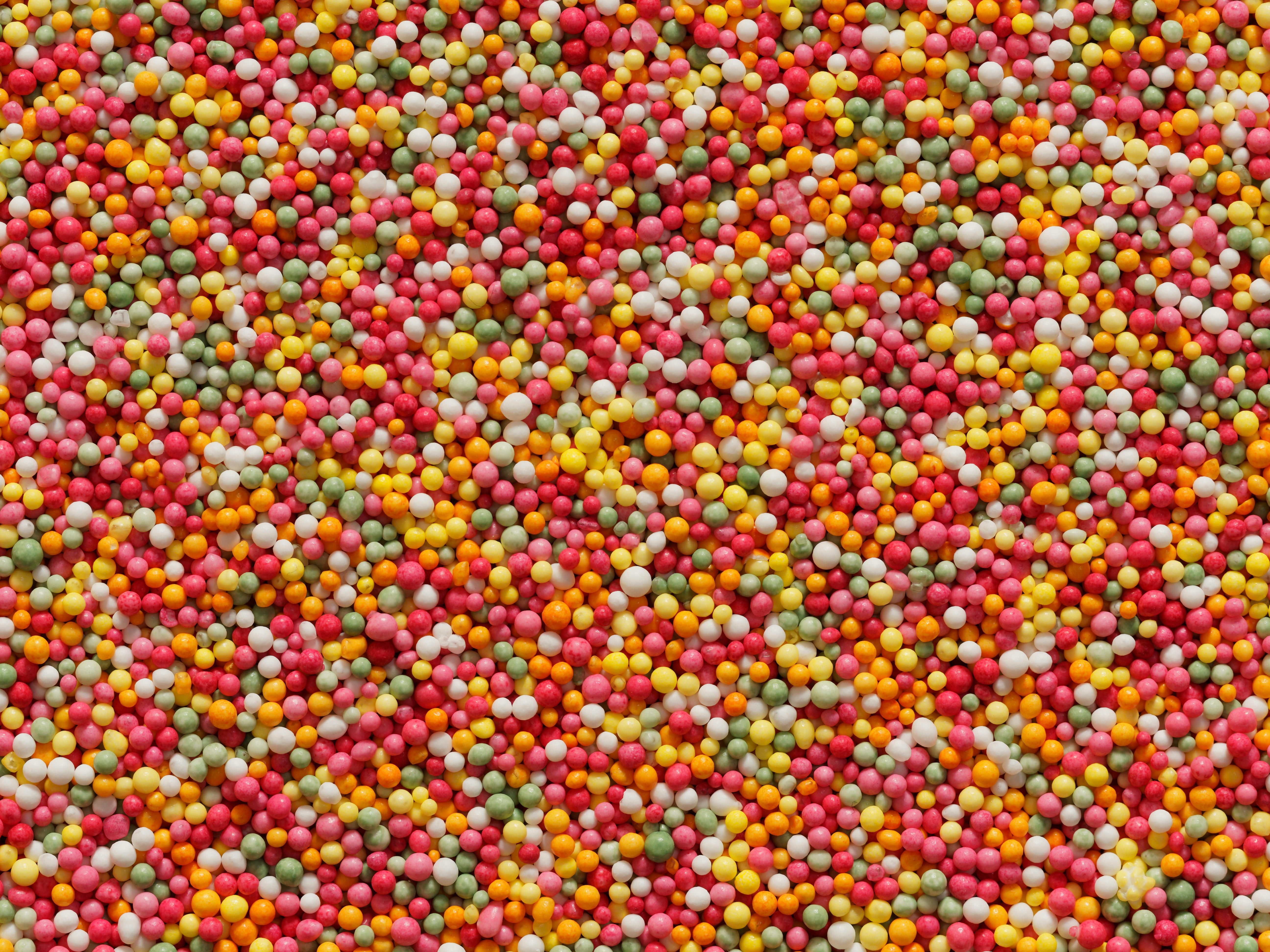 Colorful sprinkles create a delicious and vibrant background. photo ...