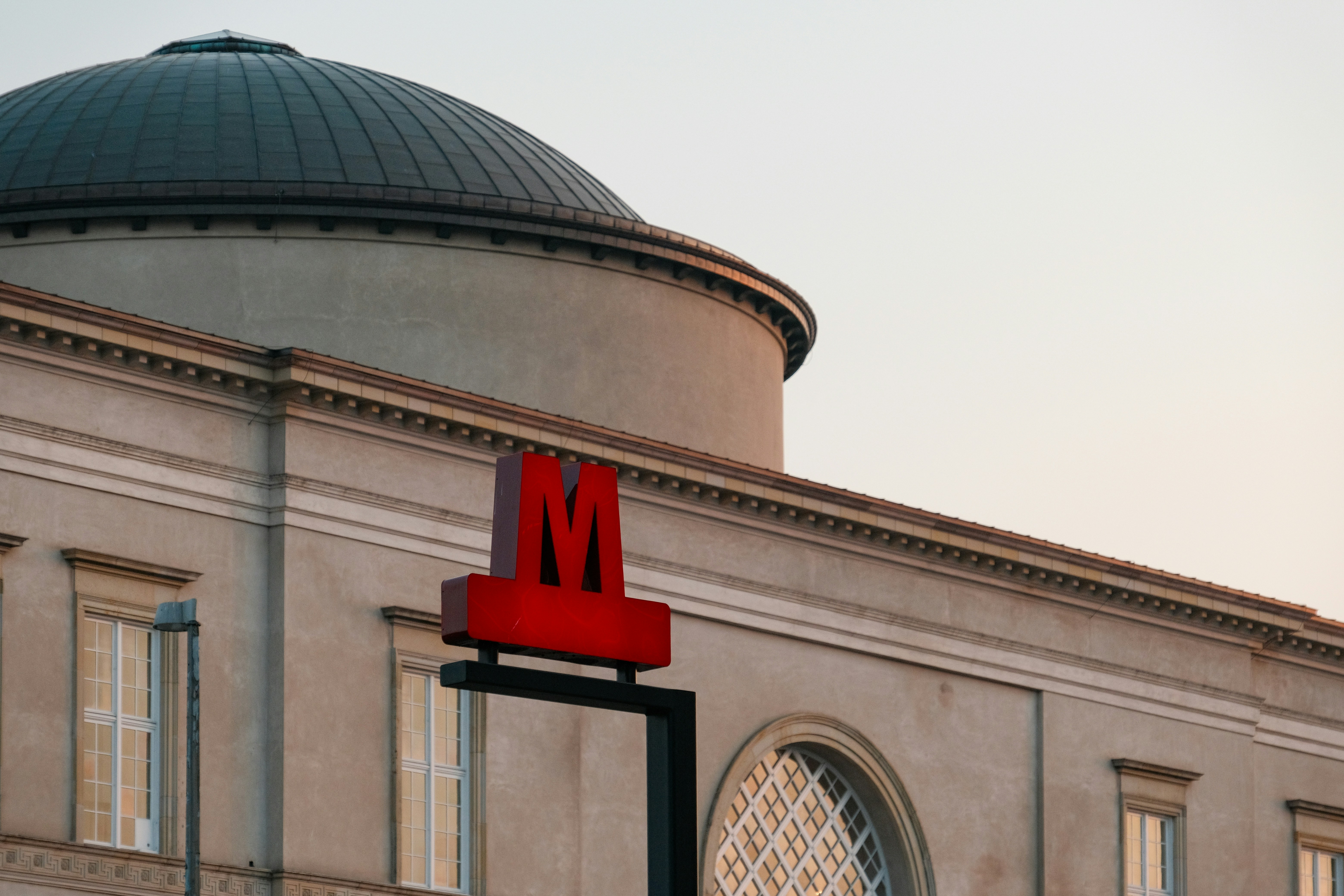 Metro station entrance with a red "m" sign. photo – Free Wallpaper ...