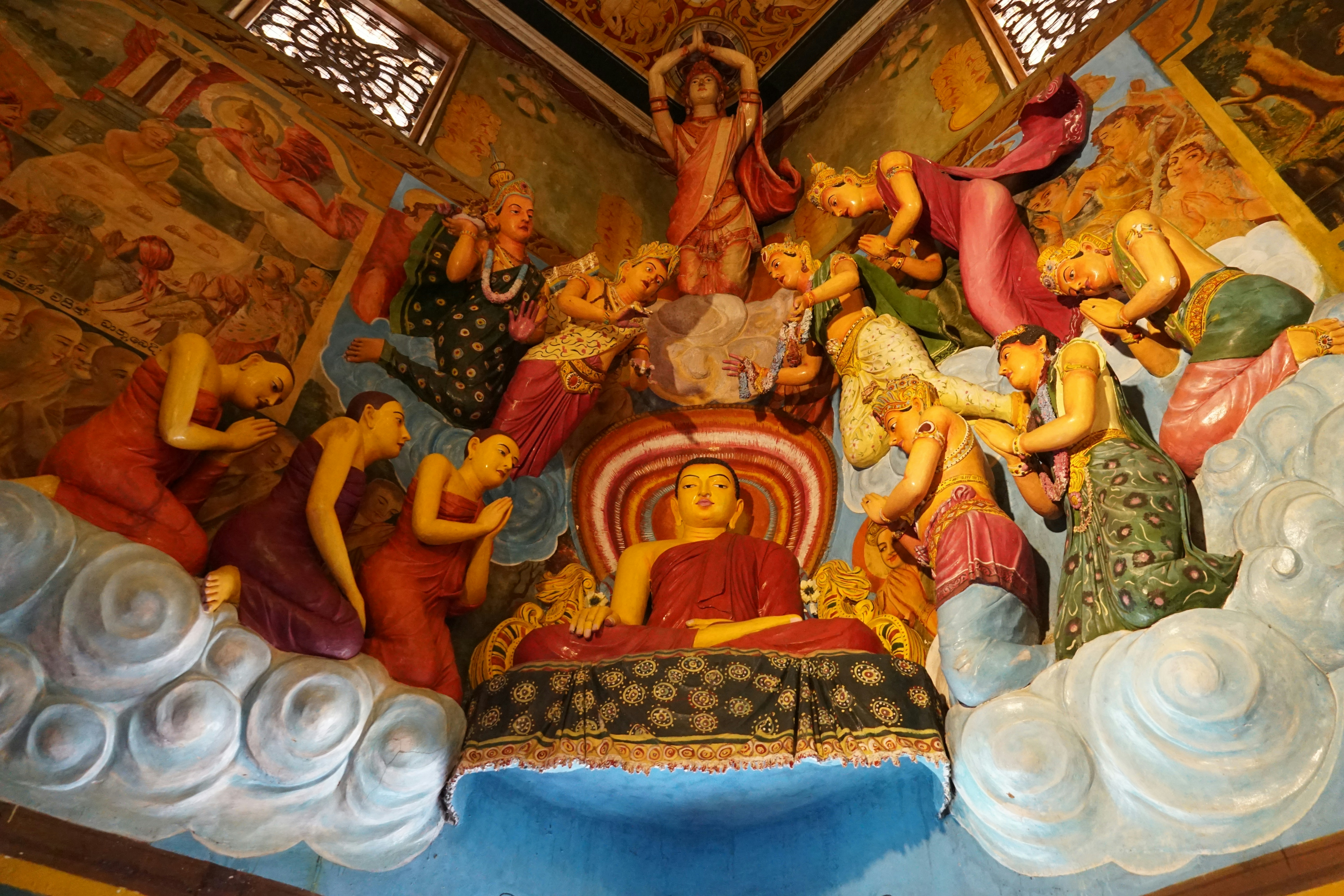 Center of Serenity: A Buddha Frieze Surrounded by Celestial Figures