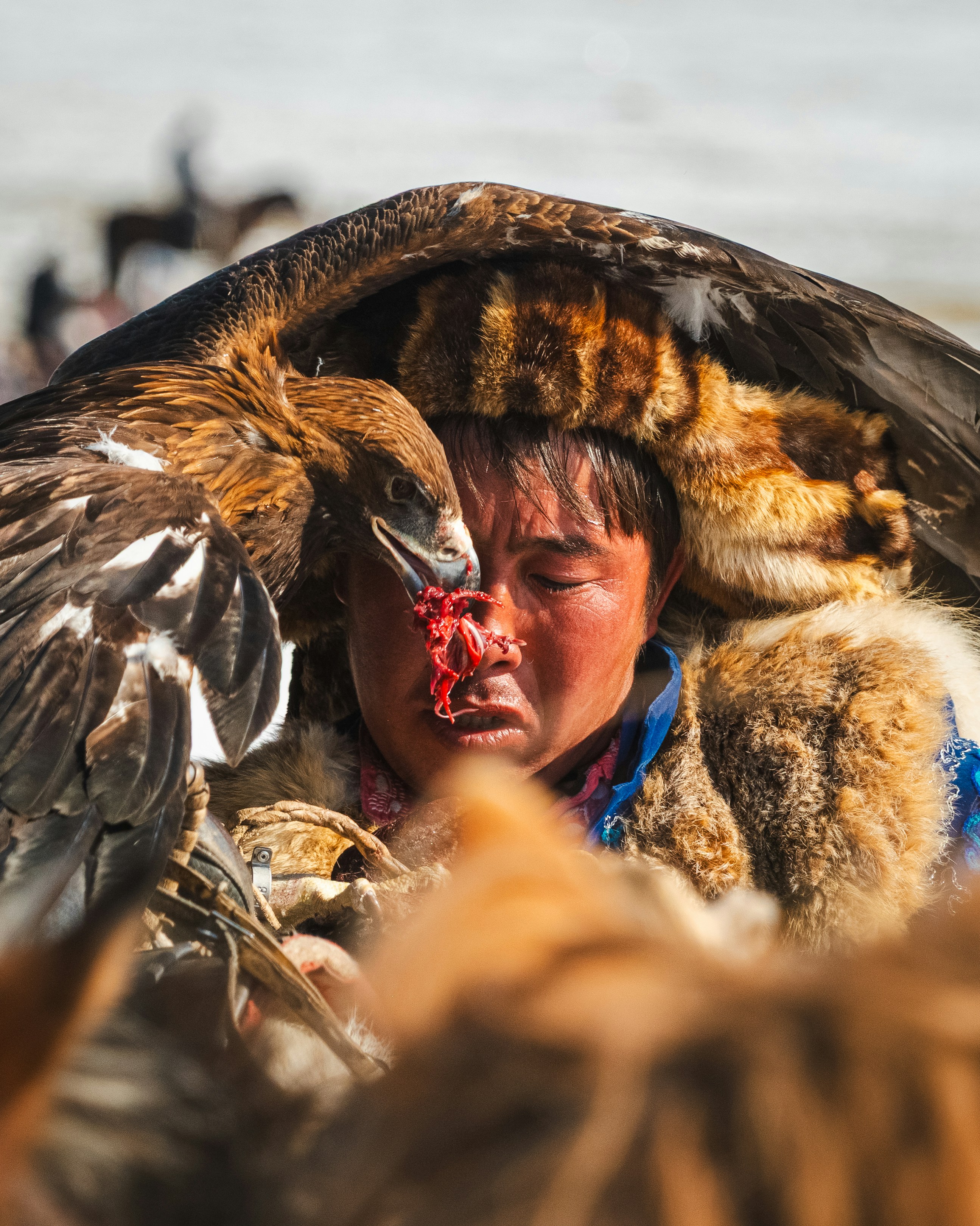 Feathered Shelter: A Shamanistic Moment Under a Bird's Embrace