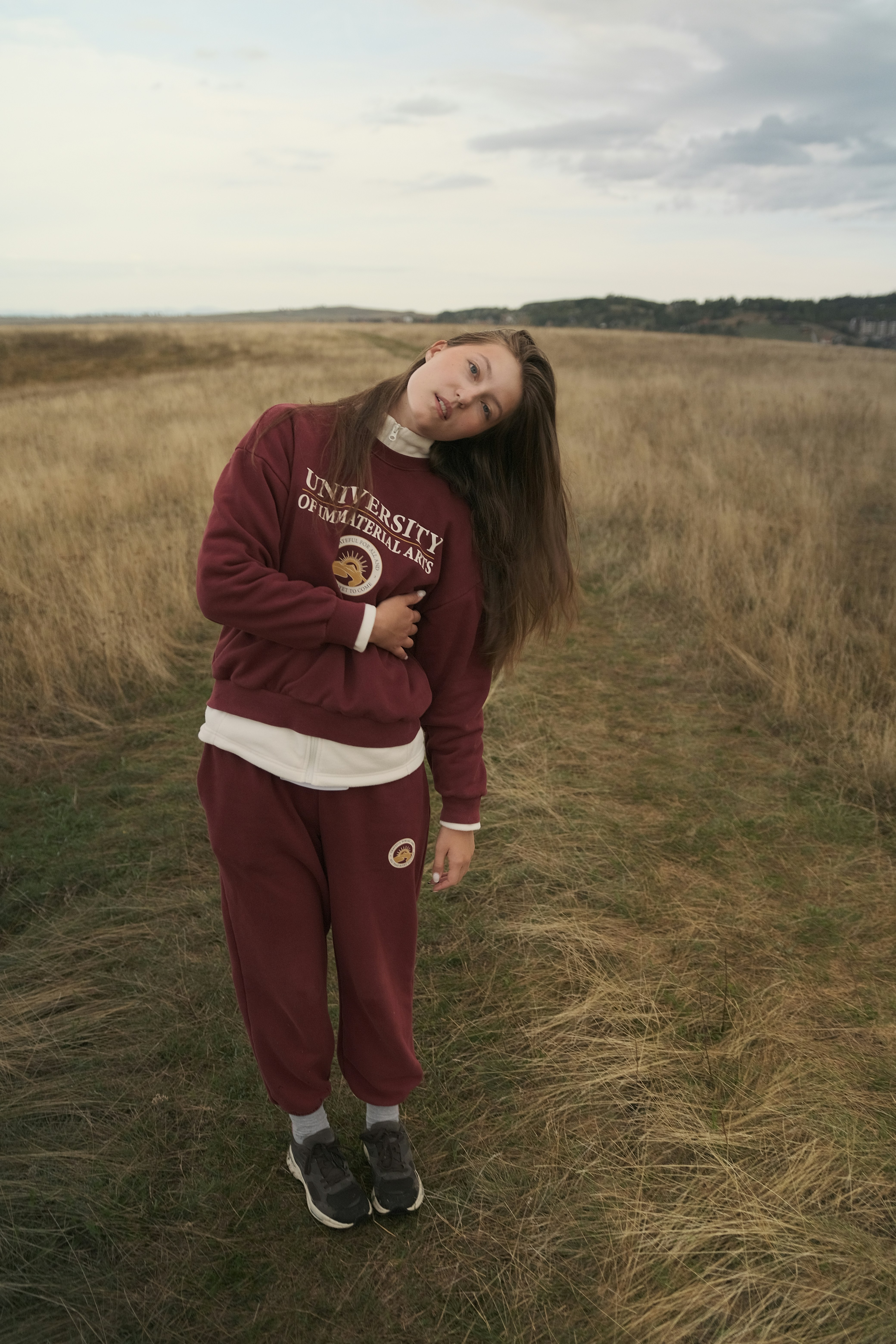 Maroon Threads on a Wind-Washed Path