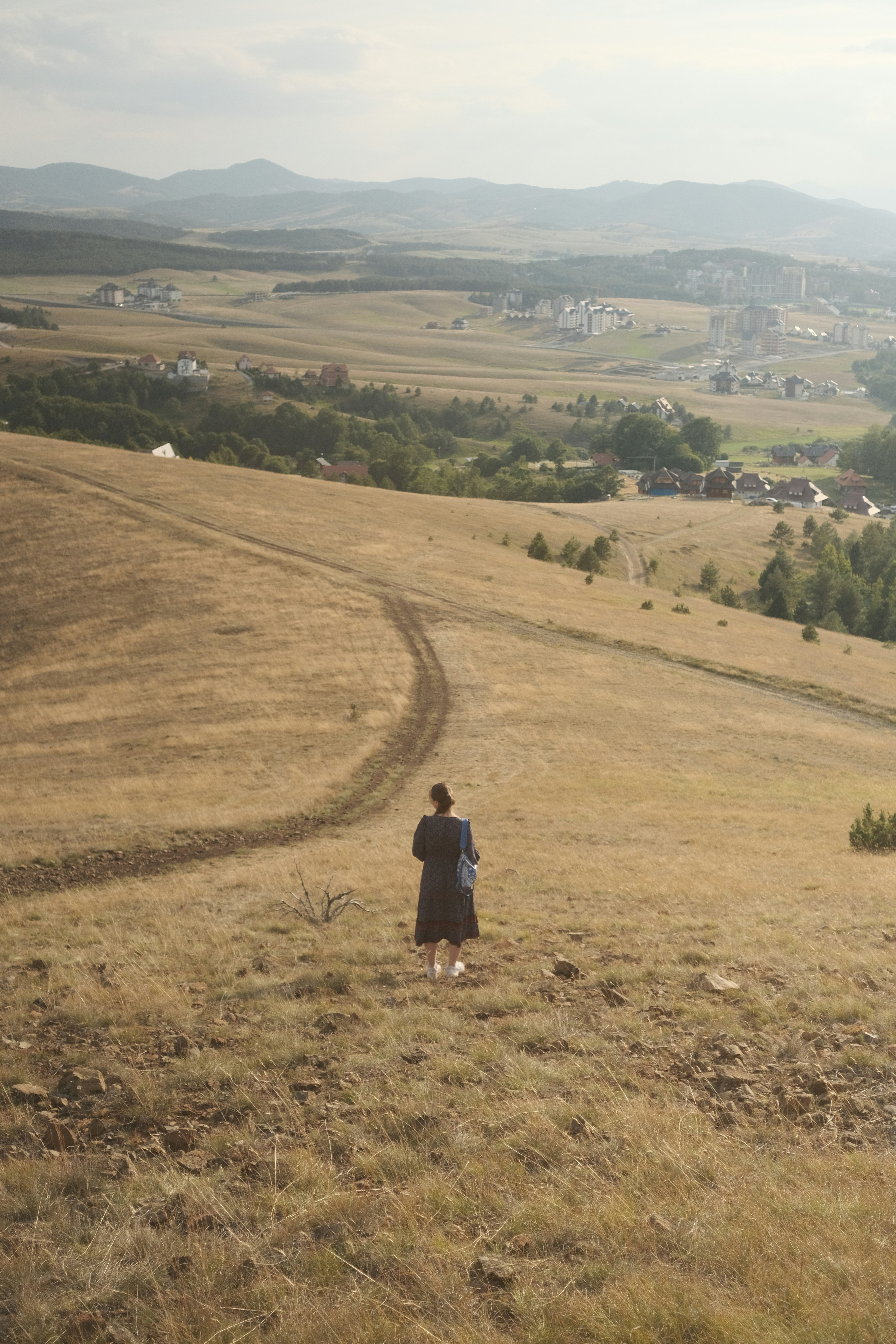 Alone on the Hill: A Quiet Walk Toward a Village Horizon