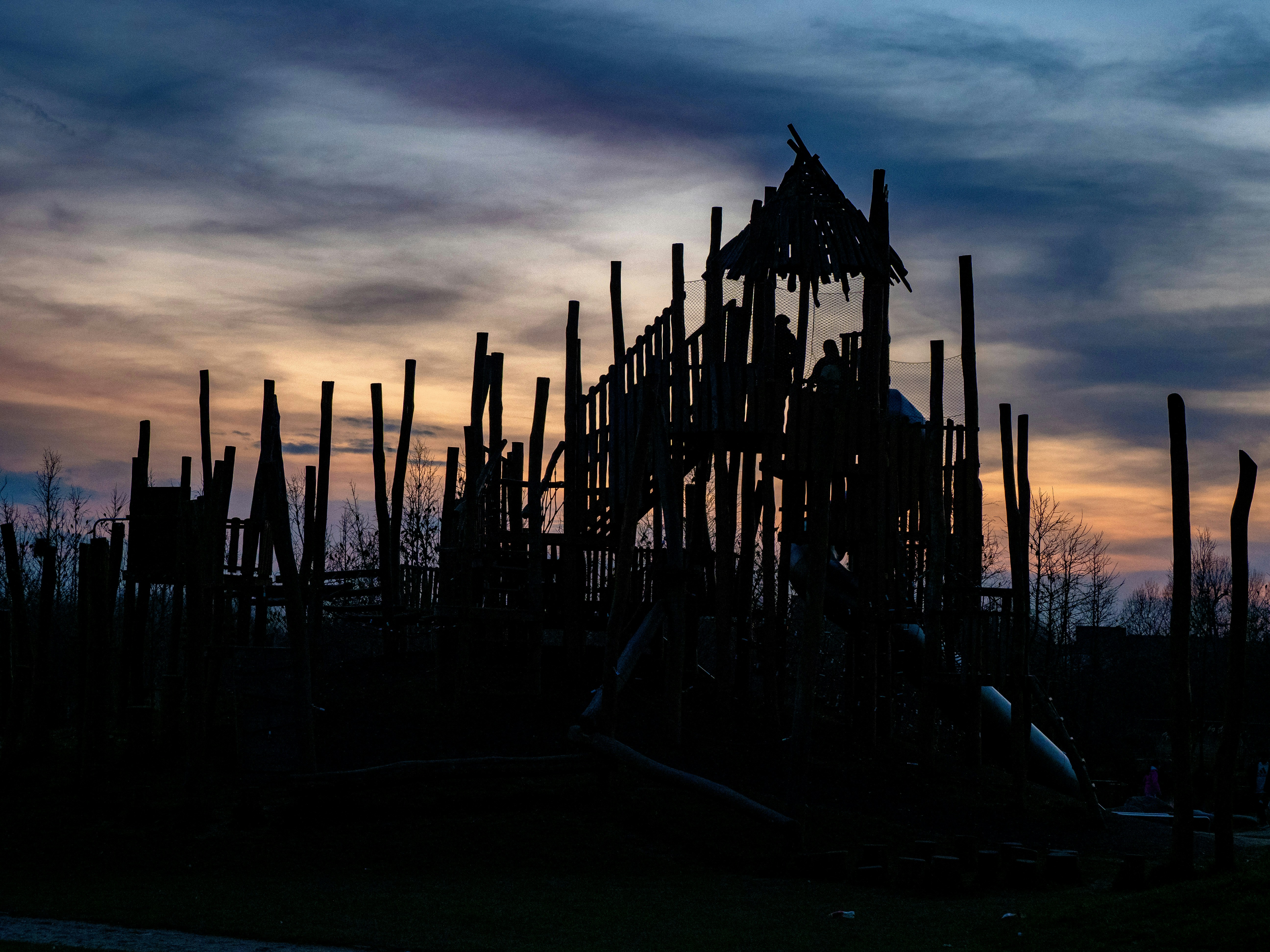 Silhouetted Playground at Twilight