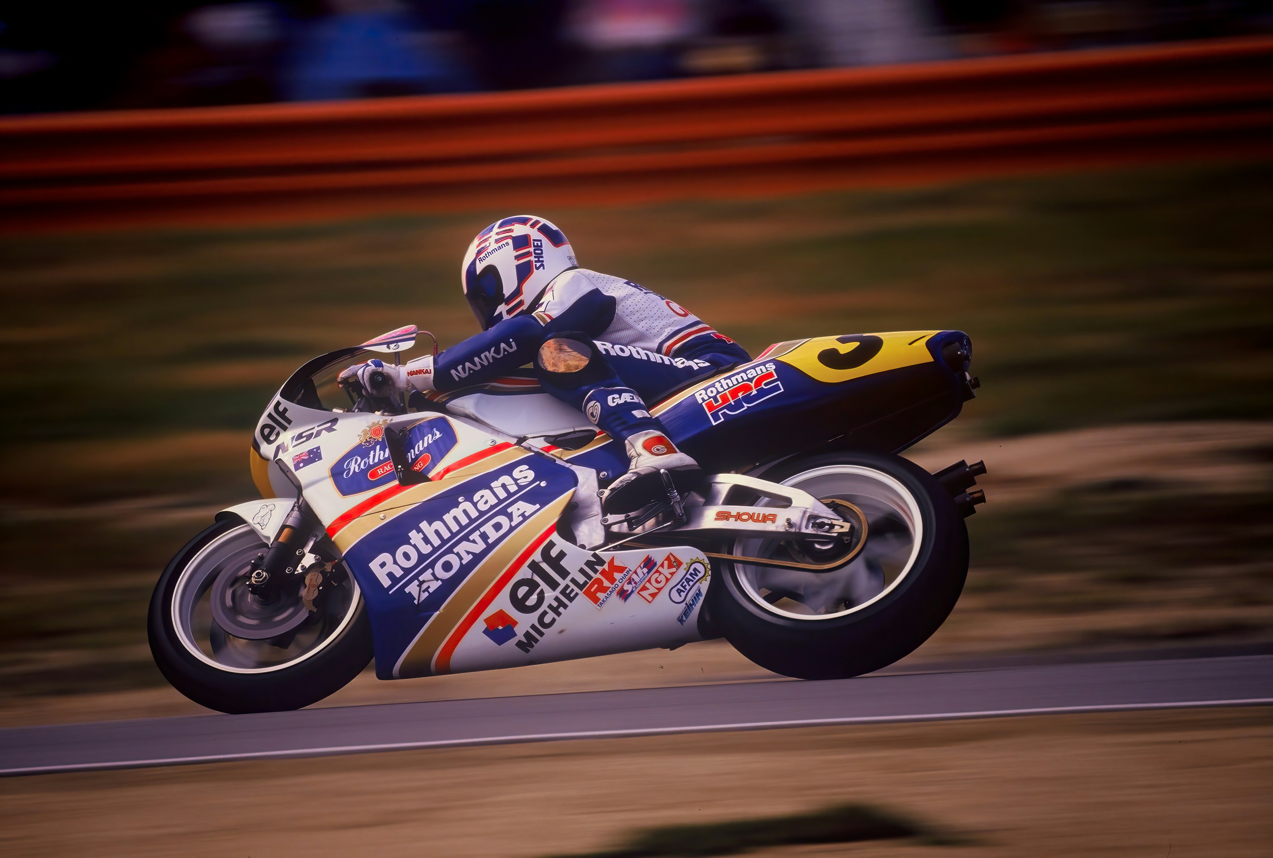 A racer speeds along on his rothmans honda motorcycle. photo – Free ...