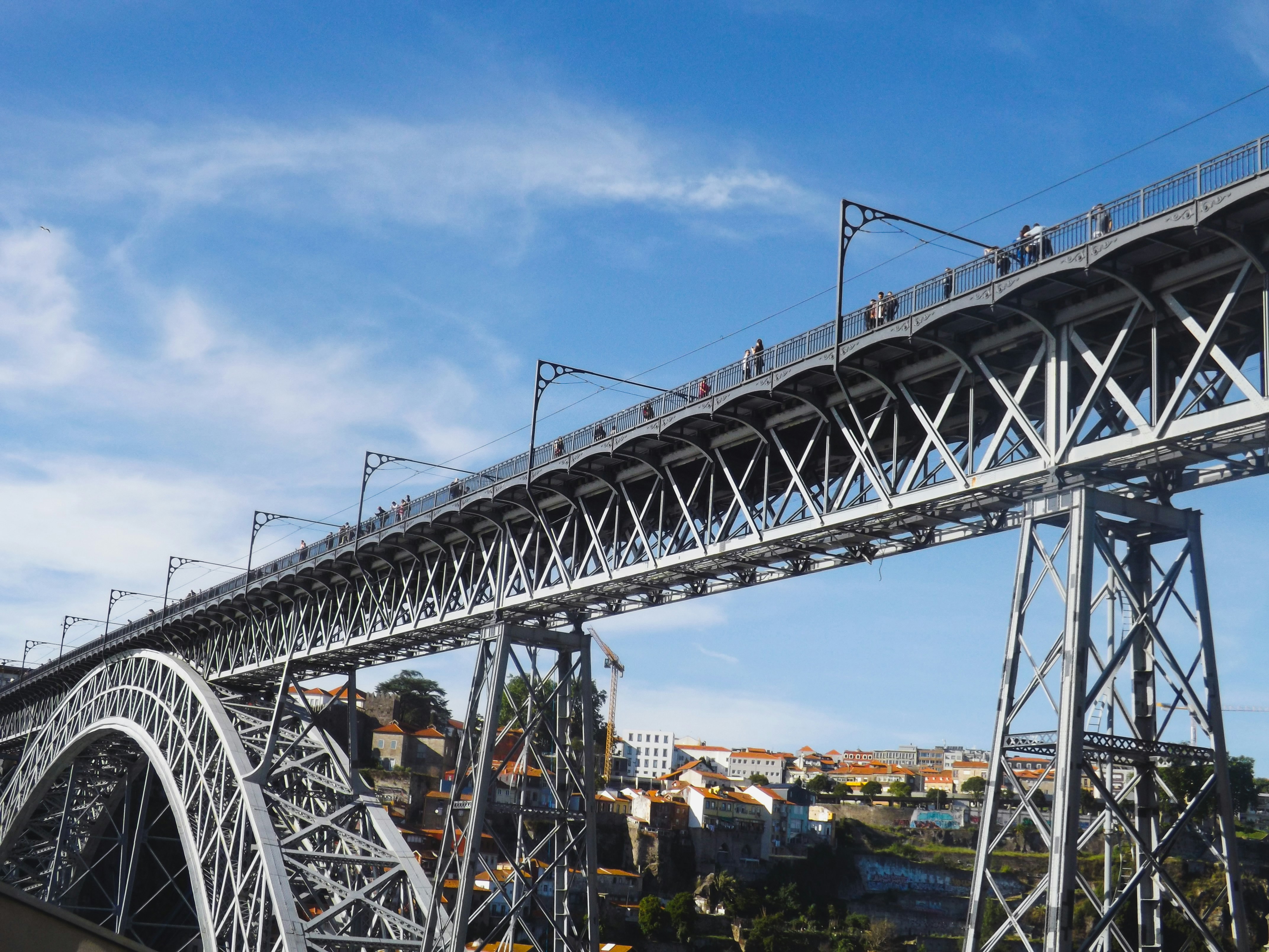 Bridge of Light: A Steel Artery Over Porto Skyline