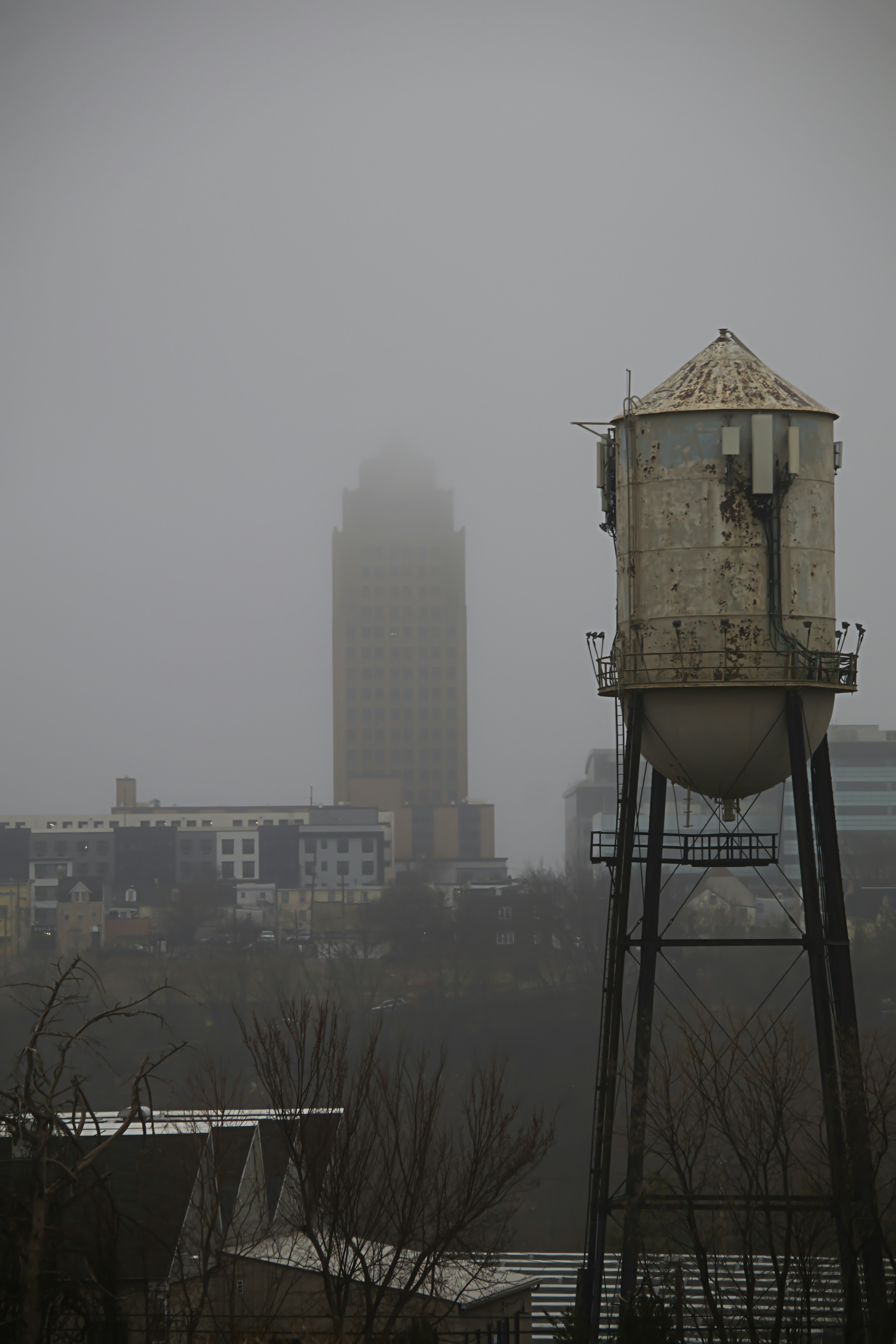 A foggy day over the city landscape.