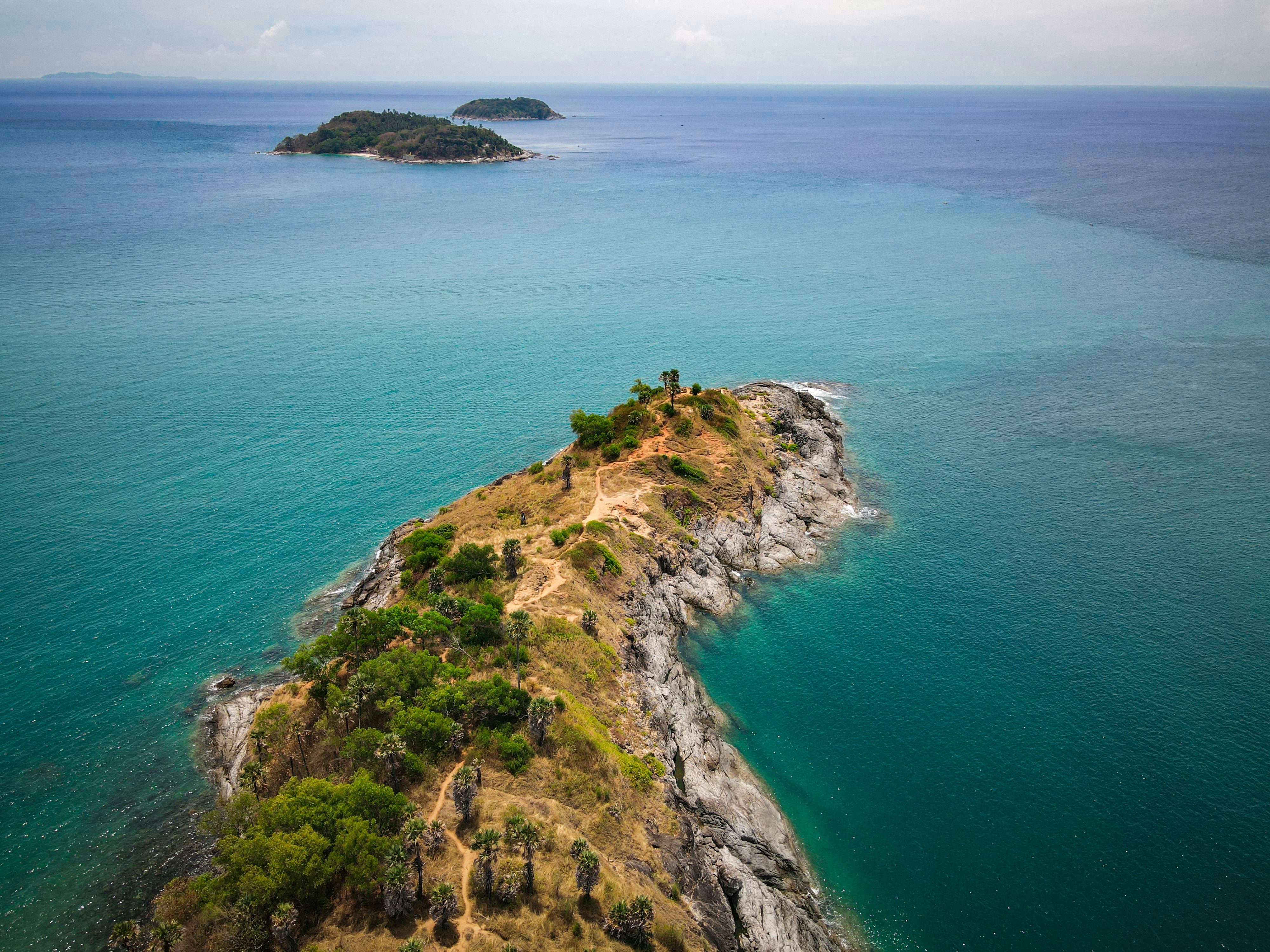 A beautiful ocean view with land formations. photo – Free Full hd ...