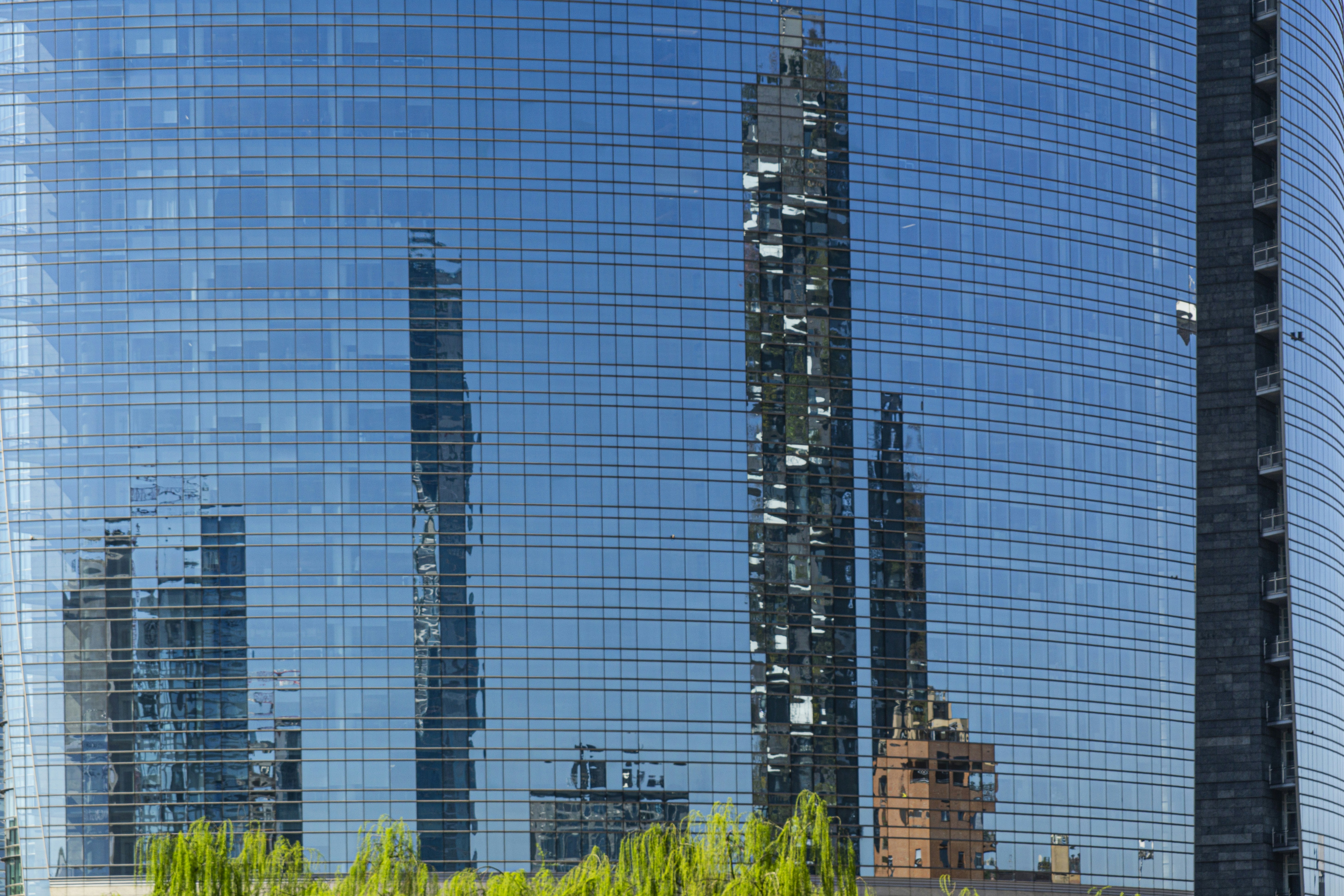 Urban Reflections in a Glass Facade
