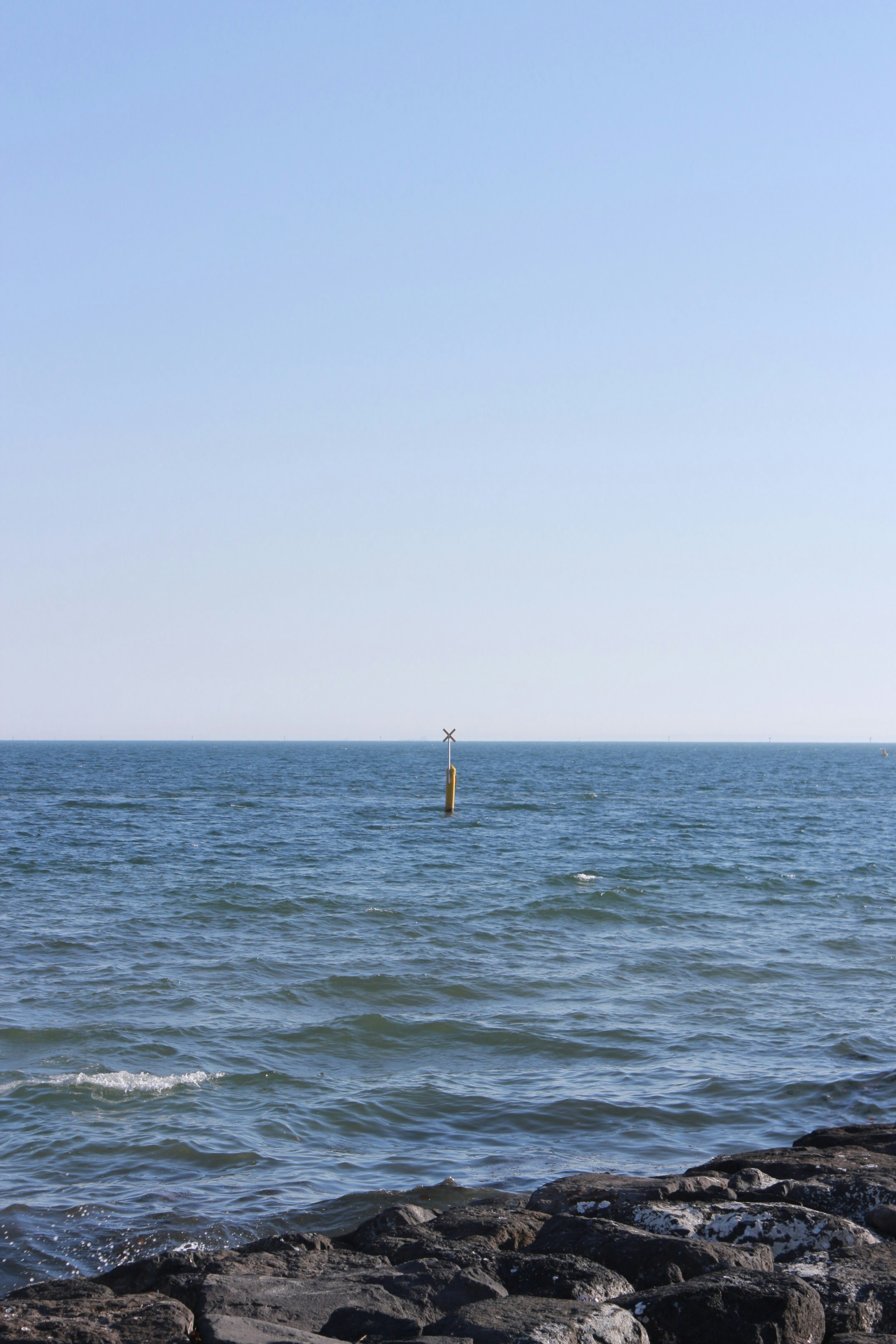 Sea Marker at Distant Horizon