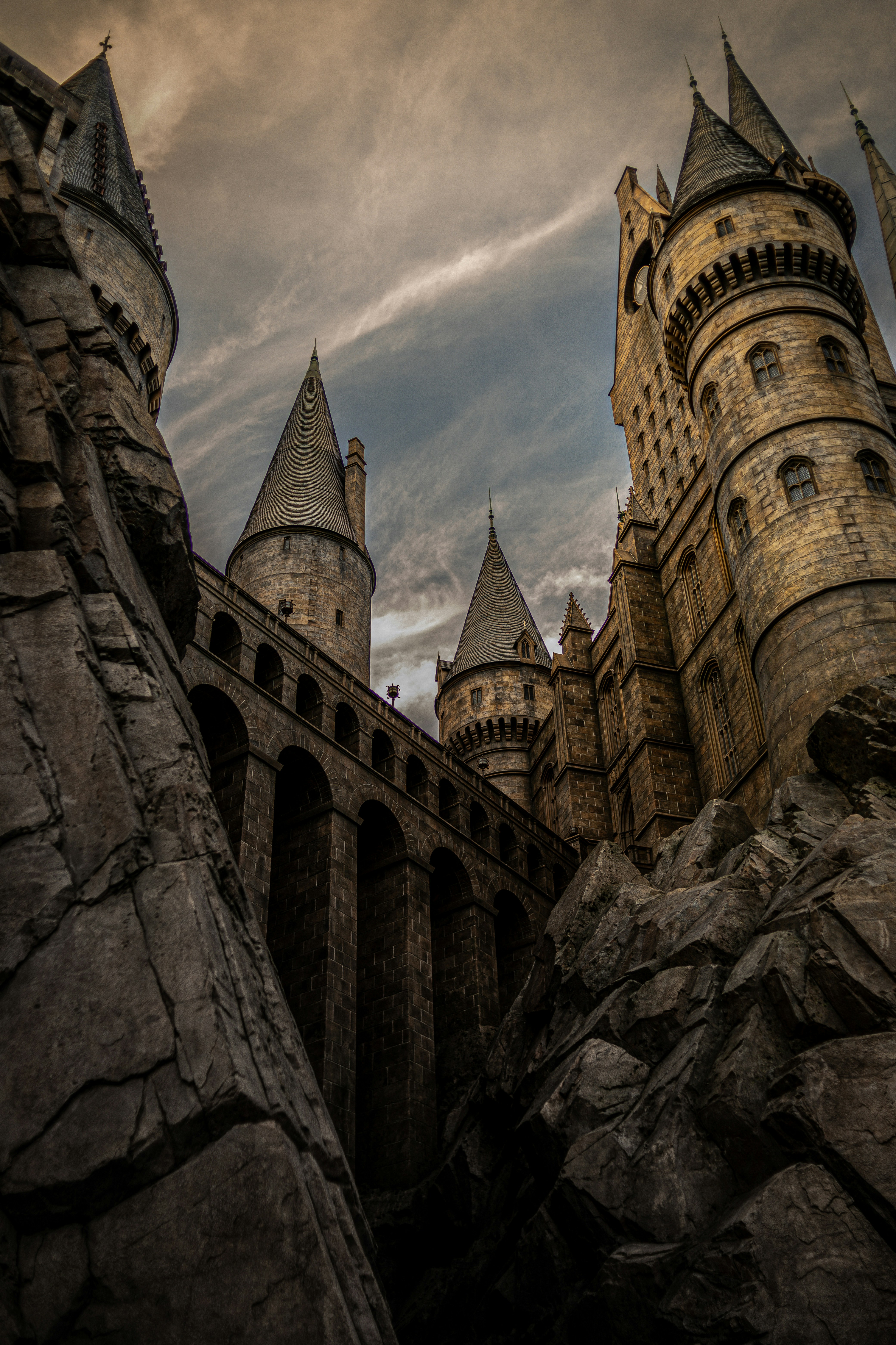 Castle on the Crag: Towers Piercing a Moody Sky