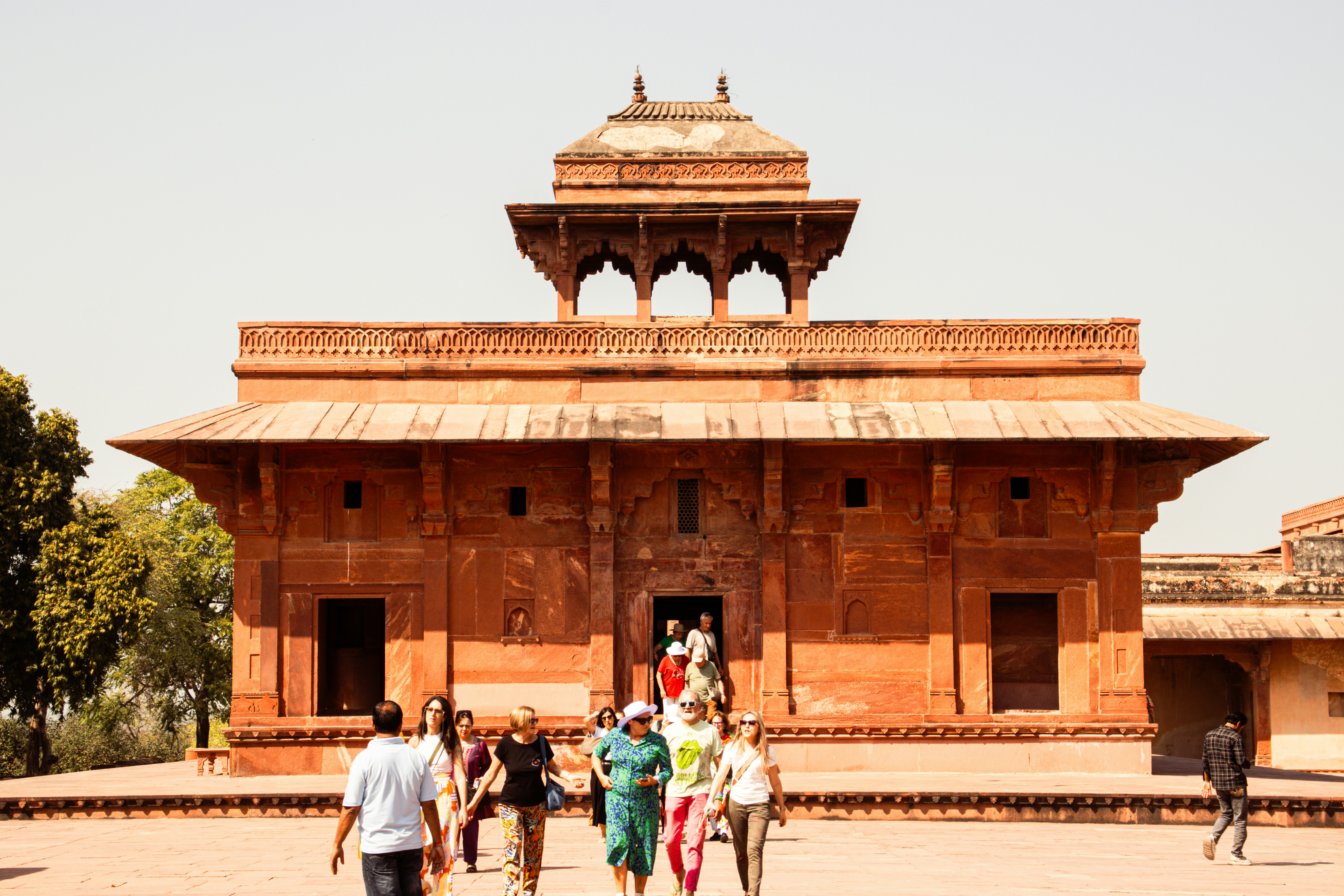 Tourists are entering a red sandstone building. photo – Free Building ...