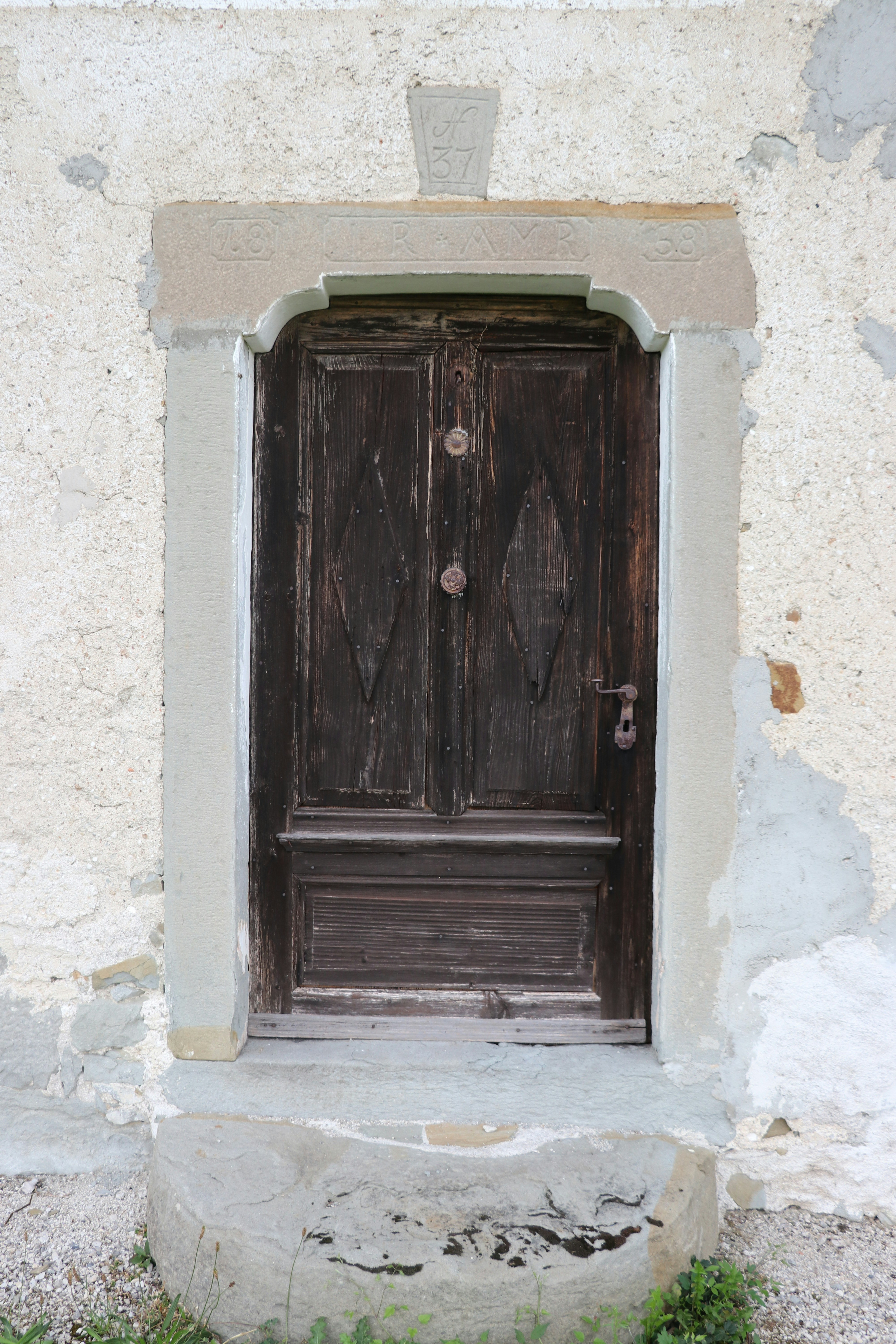 Old, wooden door set in a crumbling white wall. photo – Free Wood Image ...