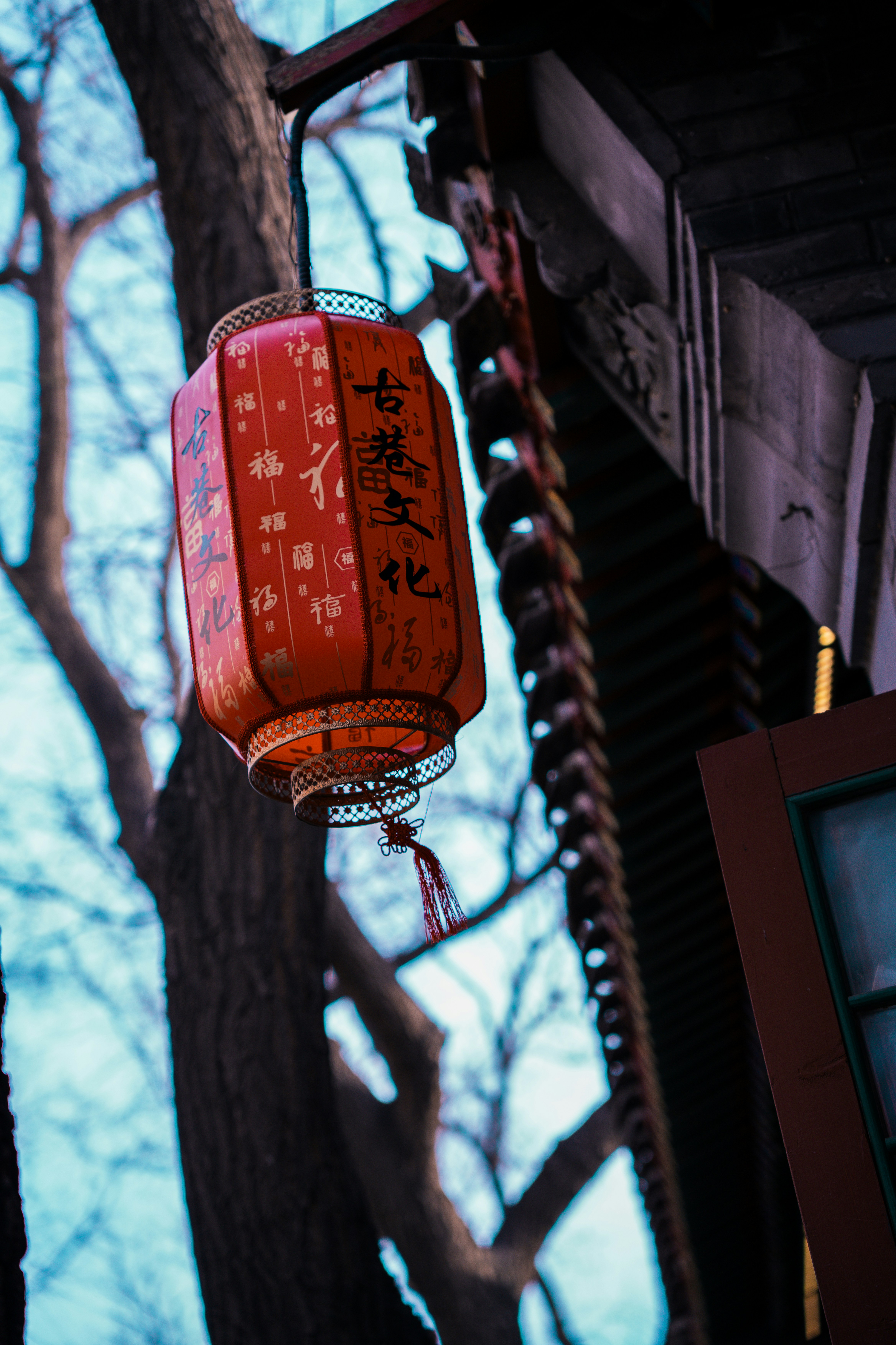 Red Lantern in a Quiet Temple Courtyard