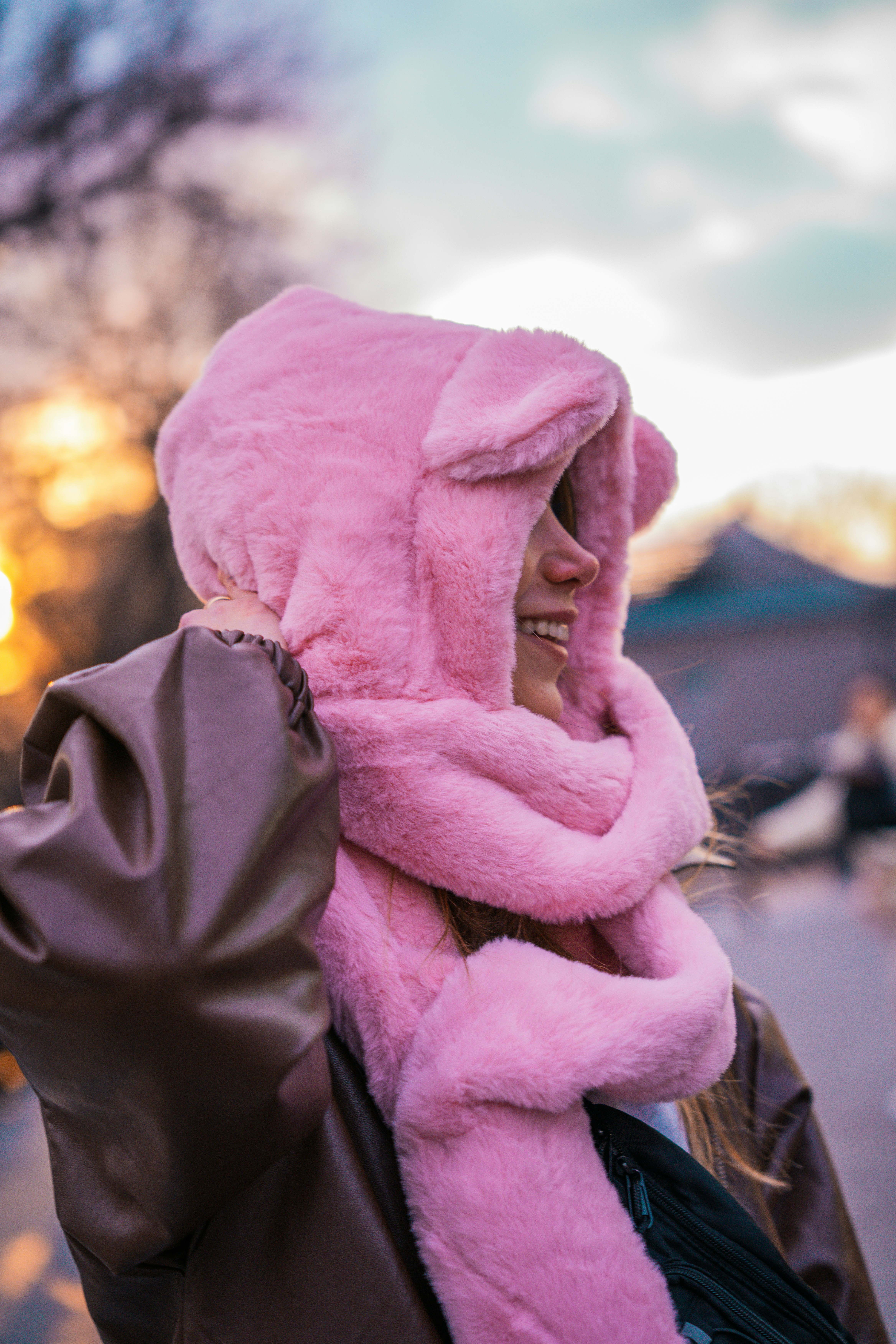 Pink Velvet at Sunset: A Soft-Focused Portrait on a City Street