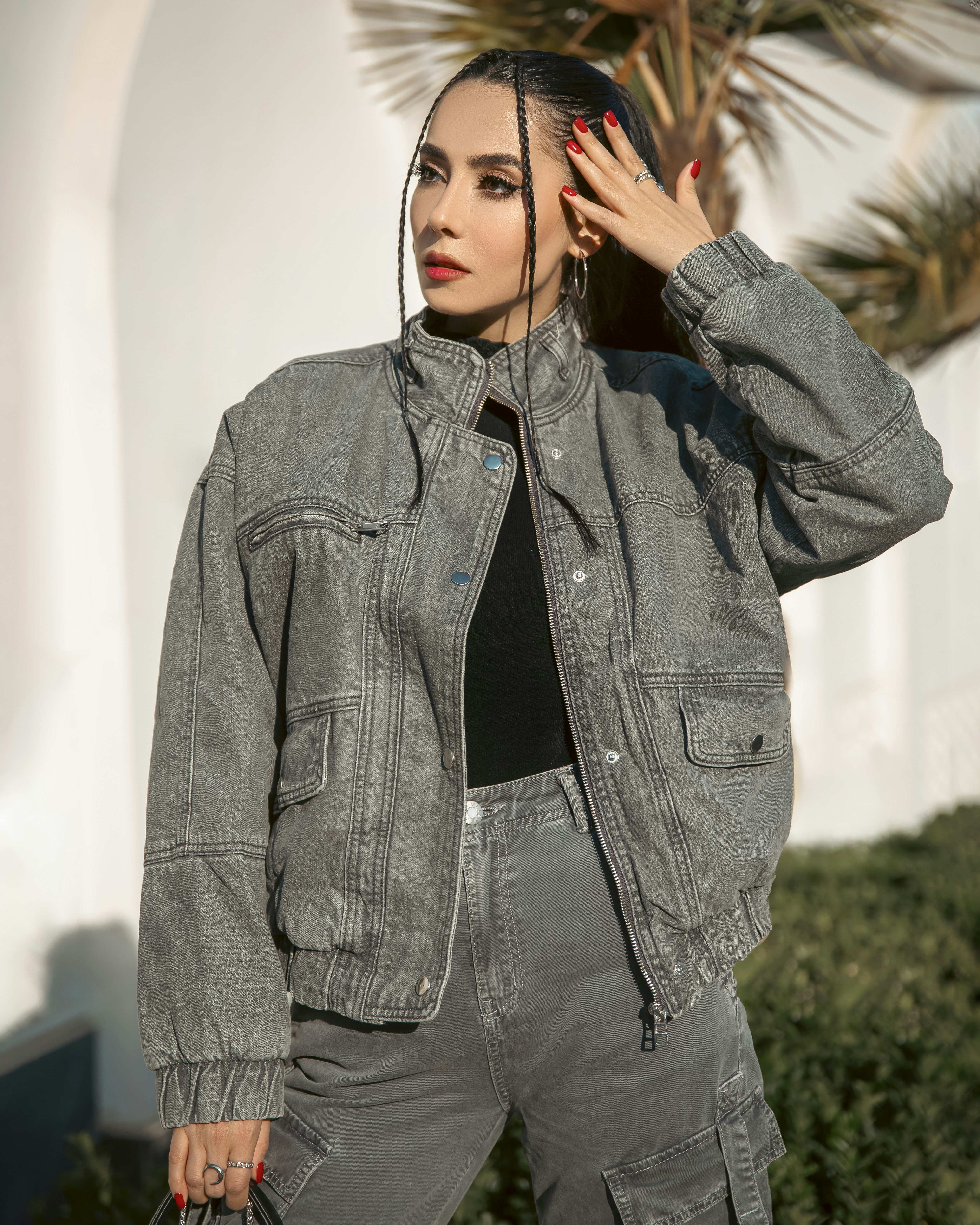 Grey Denim Focus: A Confident Portrait in Soft Sun