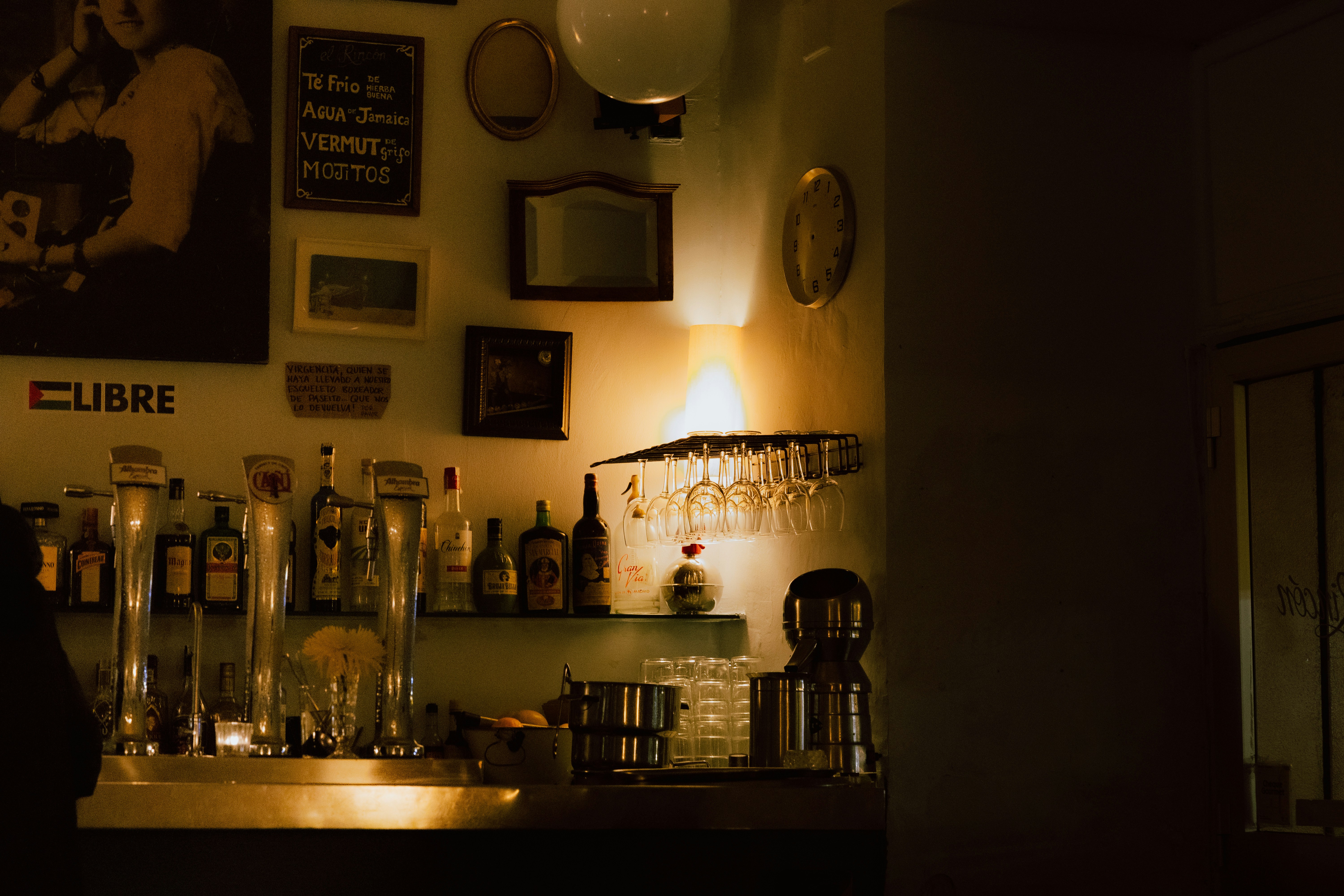 Cozy, dim interior of a bar with drinks. photo – Free Human Image on ...