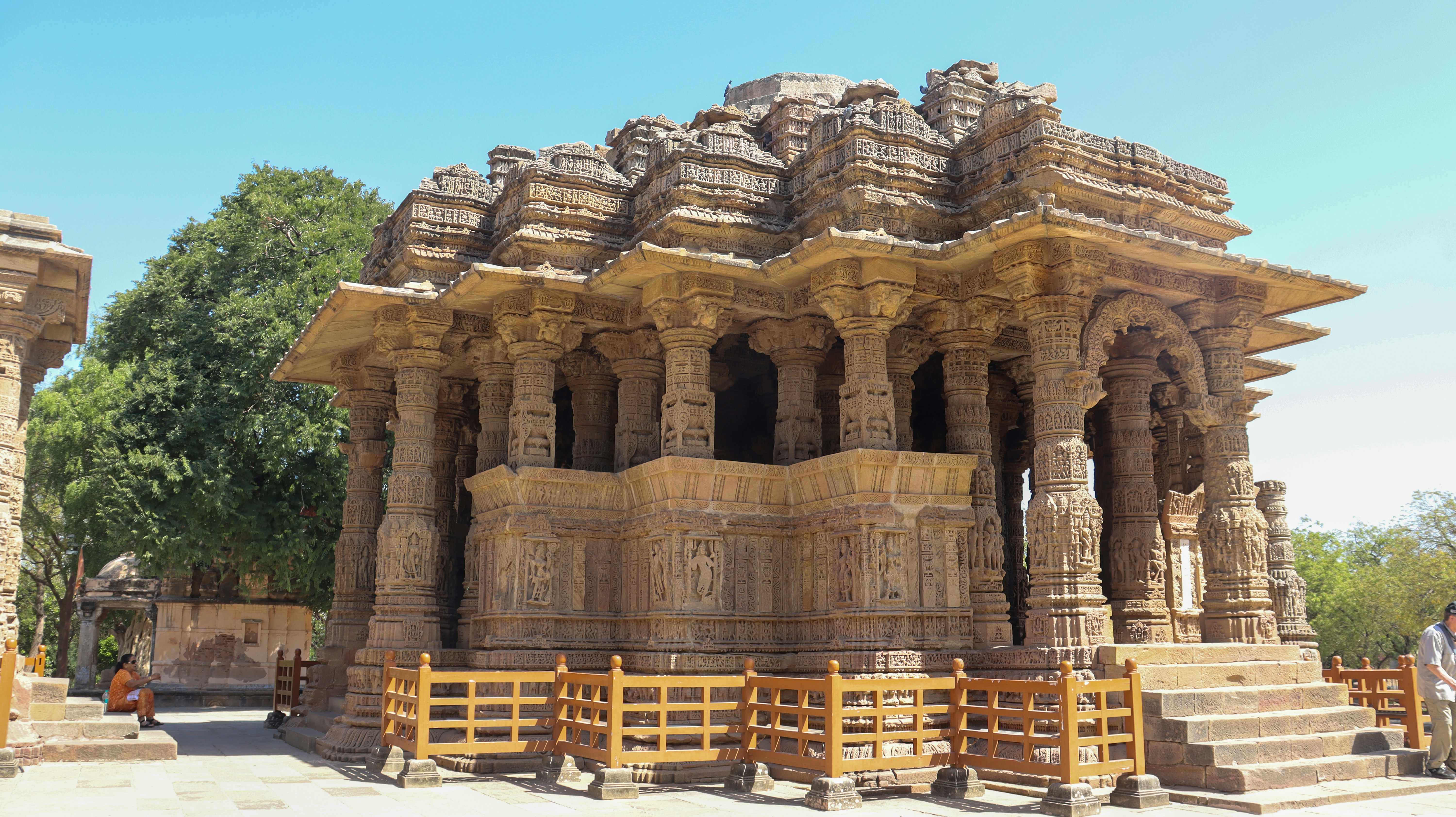 A stone temple stands in the bright sunlight. photo – Free Human Image ...