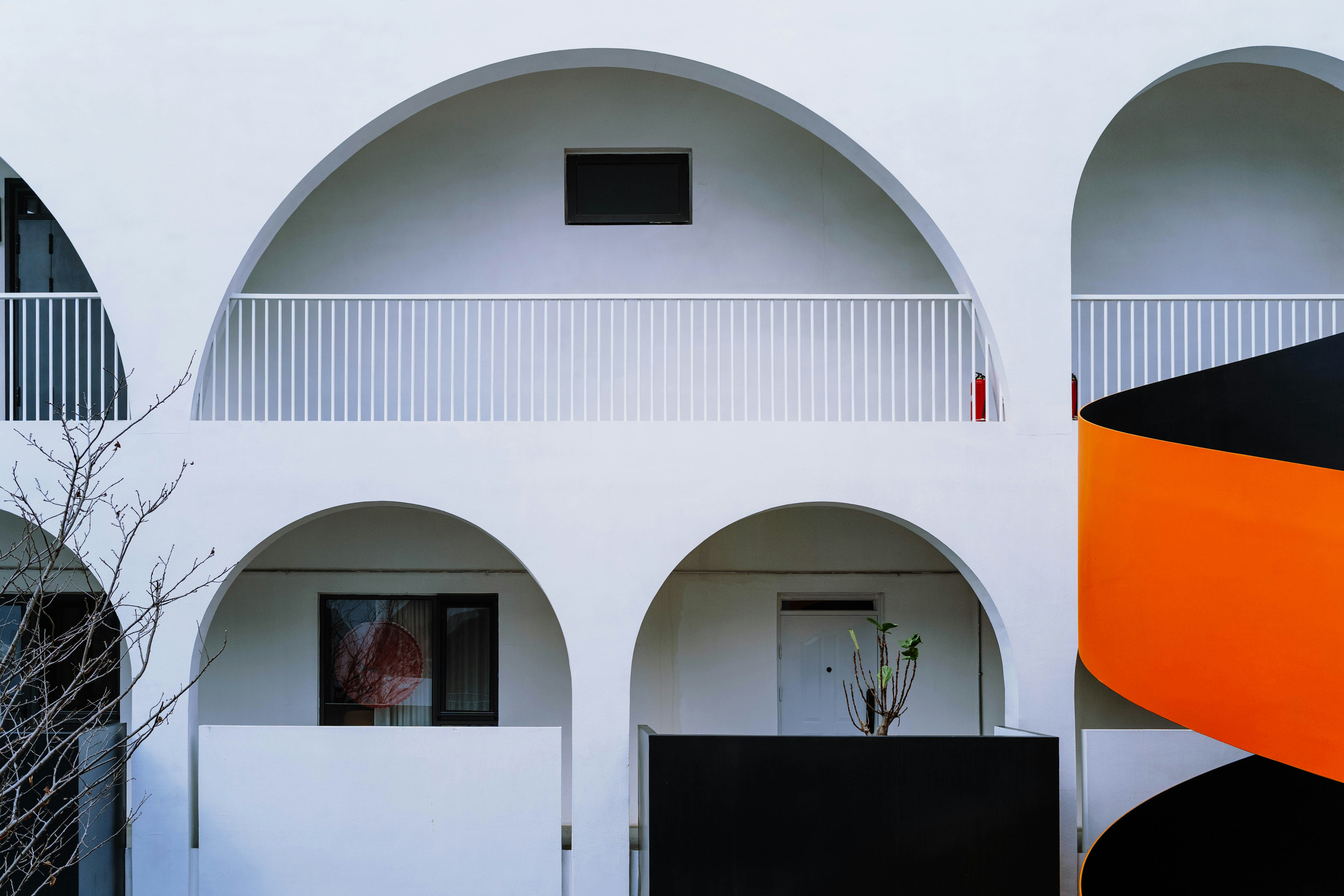 Architectural Harmony with a Splash of Orange