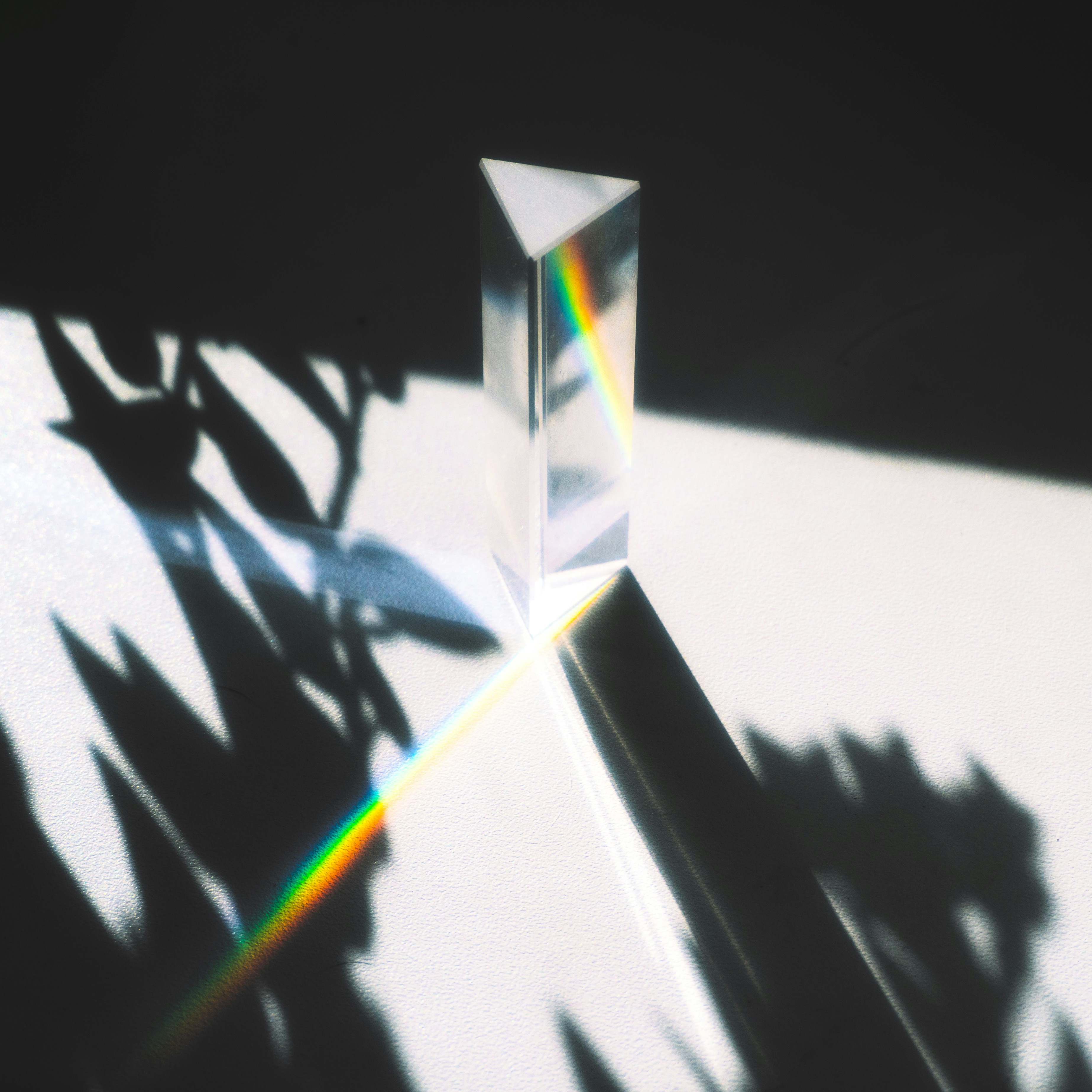 A prism refracts light into a rainbow spectrum. photo – Free Abstract ...