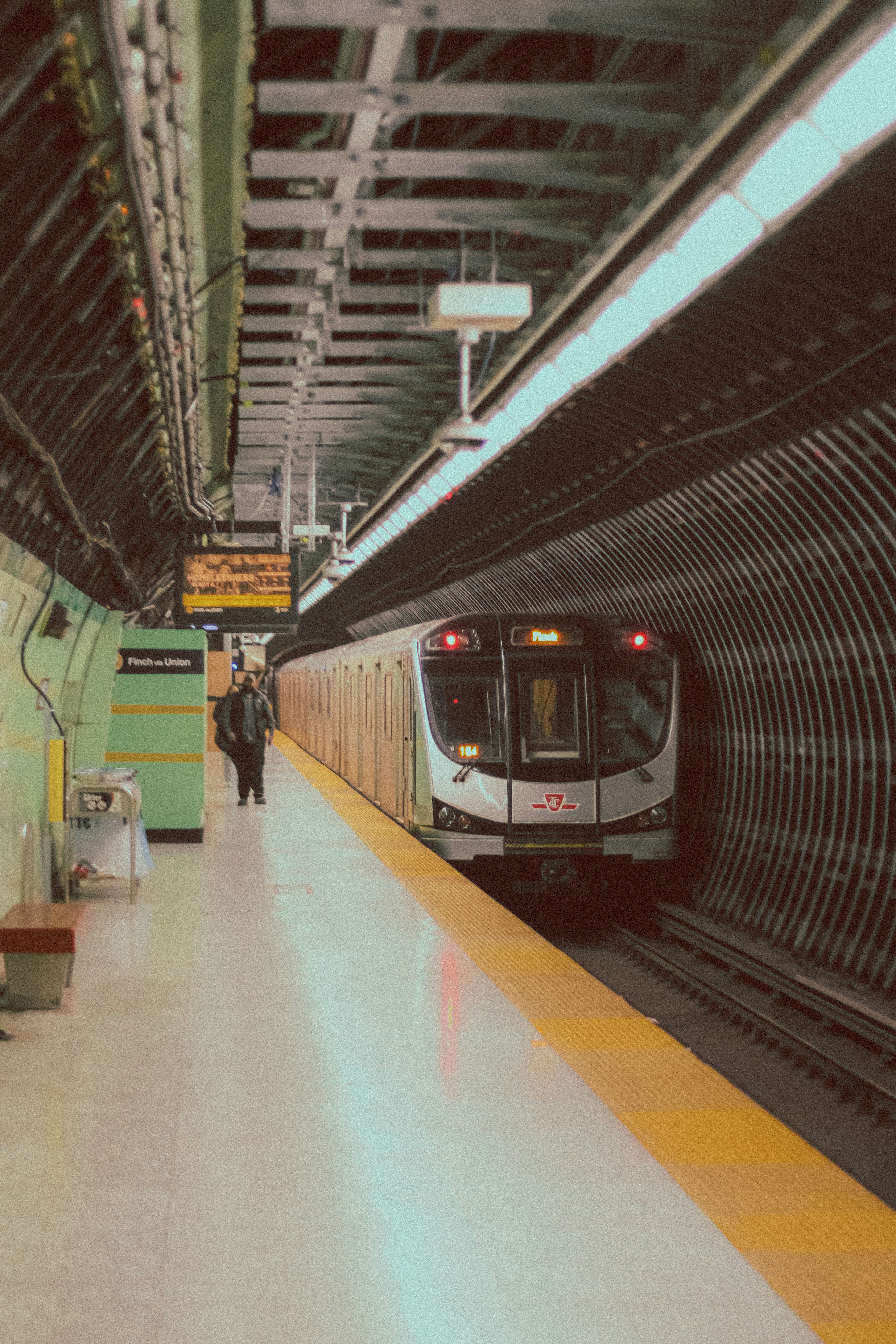 A subway train arrives at the station platform. photo – Free Train ...