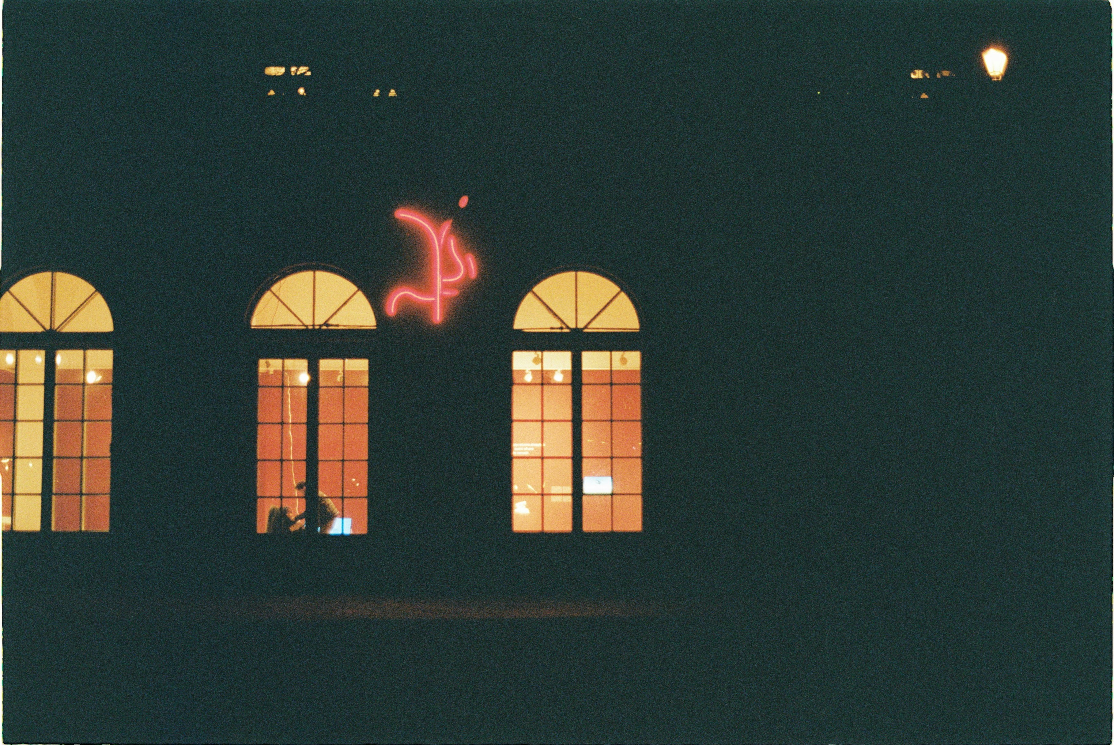 Neon Outline Over a Quiet Night Window