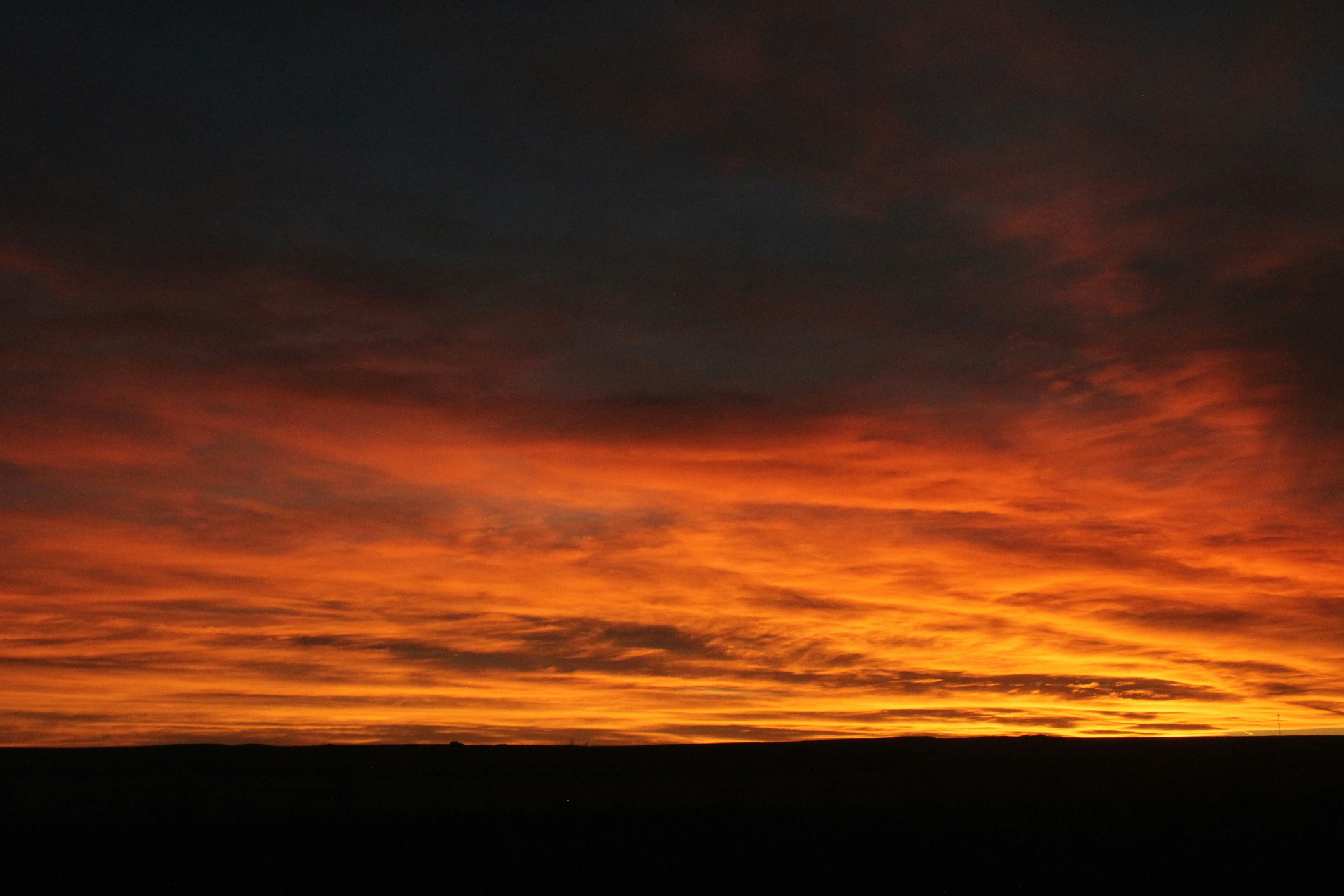 Red sky | Fiery sunset paints the sky with intense colors.