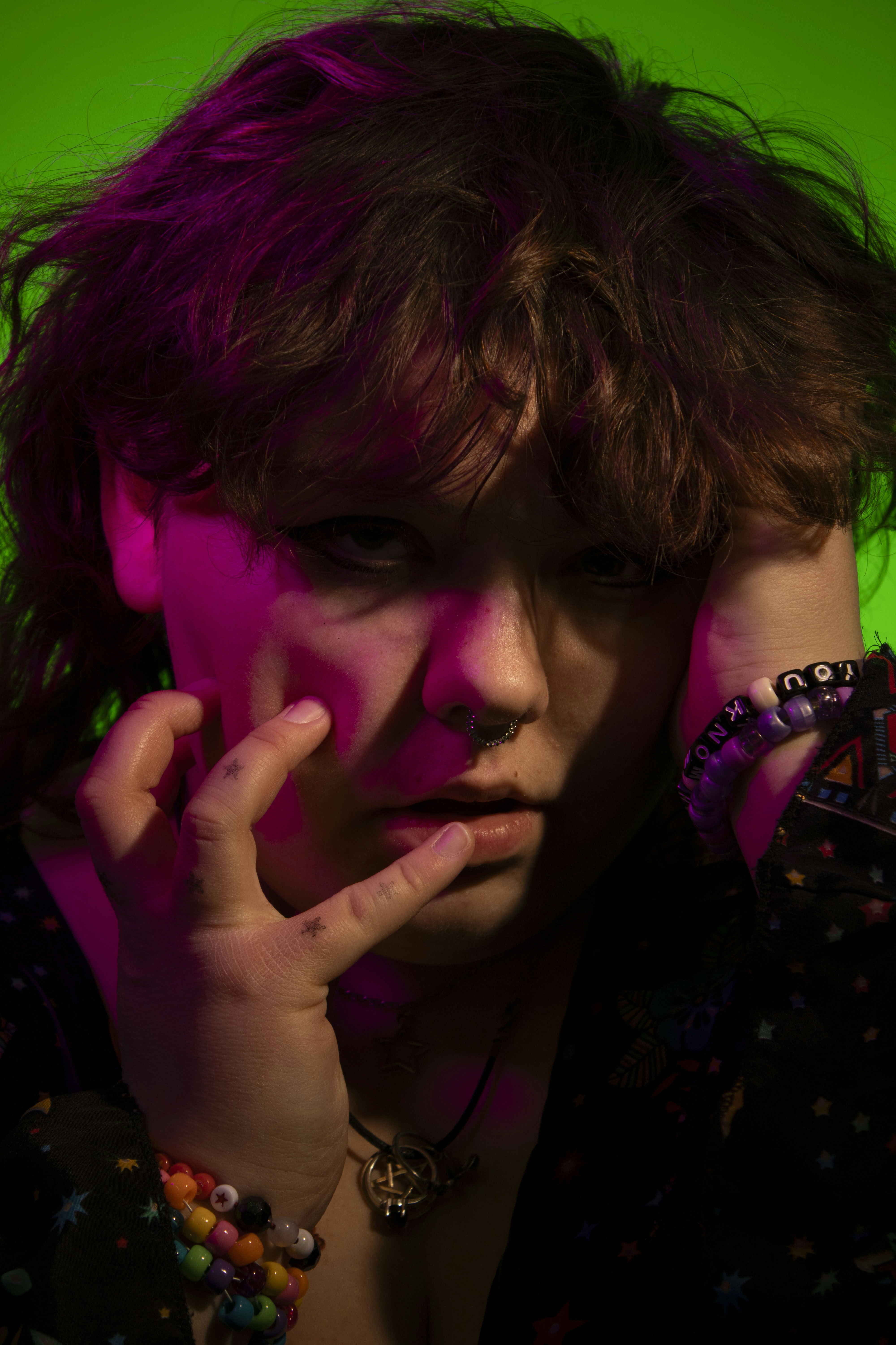 Magenta Halo, Emerald Backdrop: A Neon Portrait