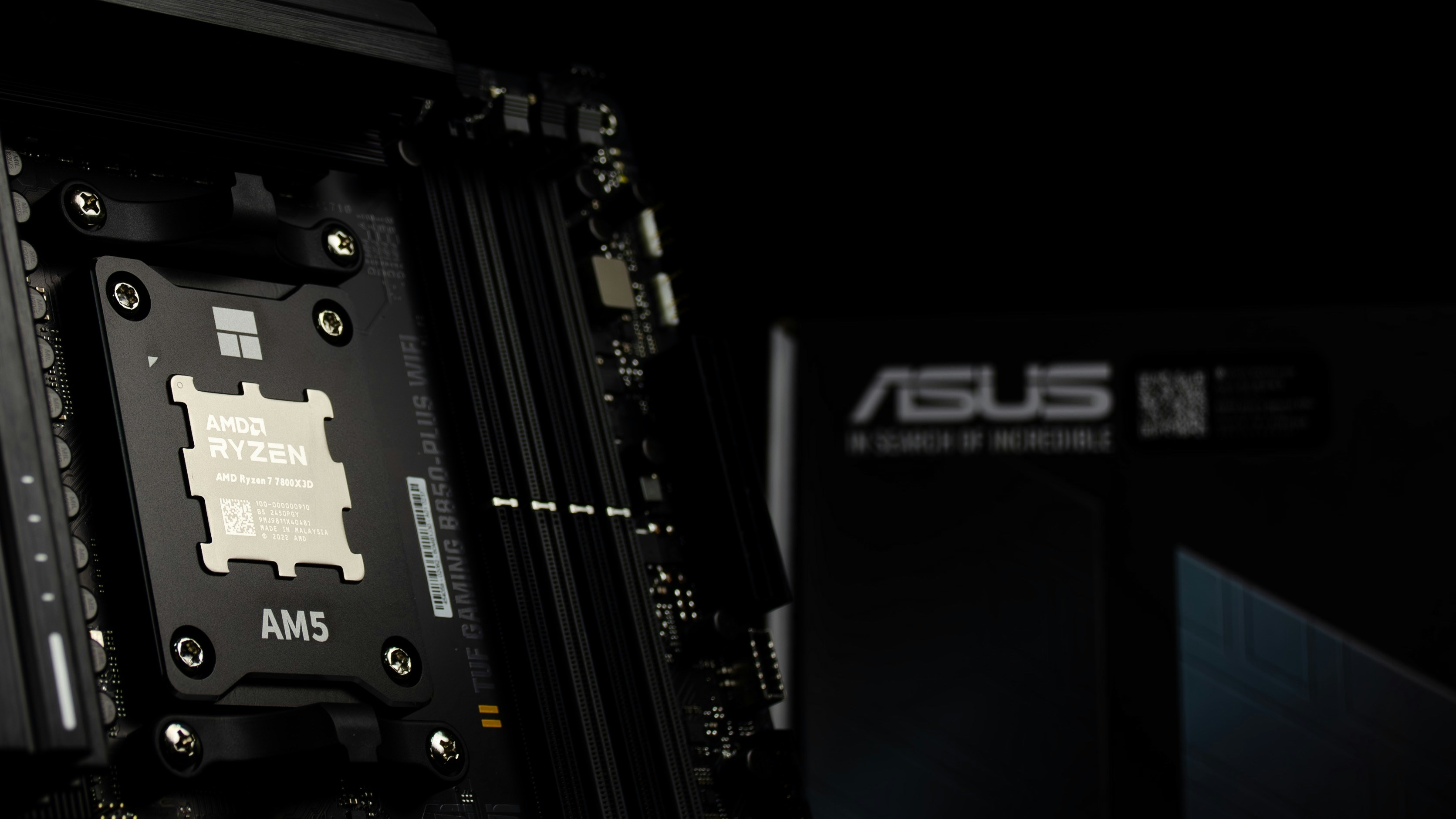 A close-up of an asus computer motherboard. photo – Free Technology ...