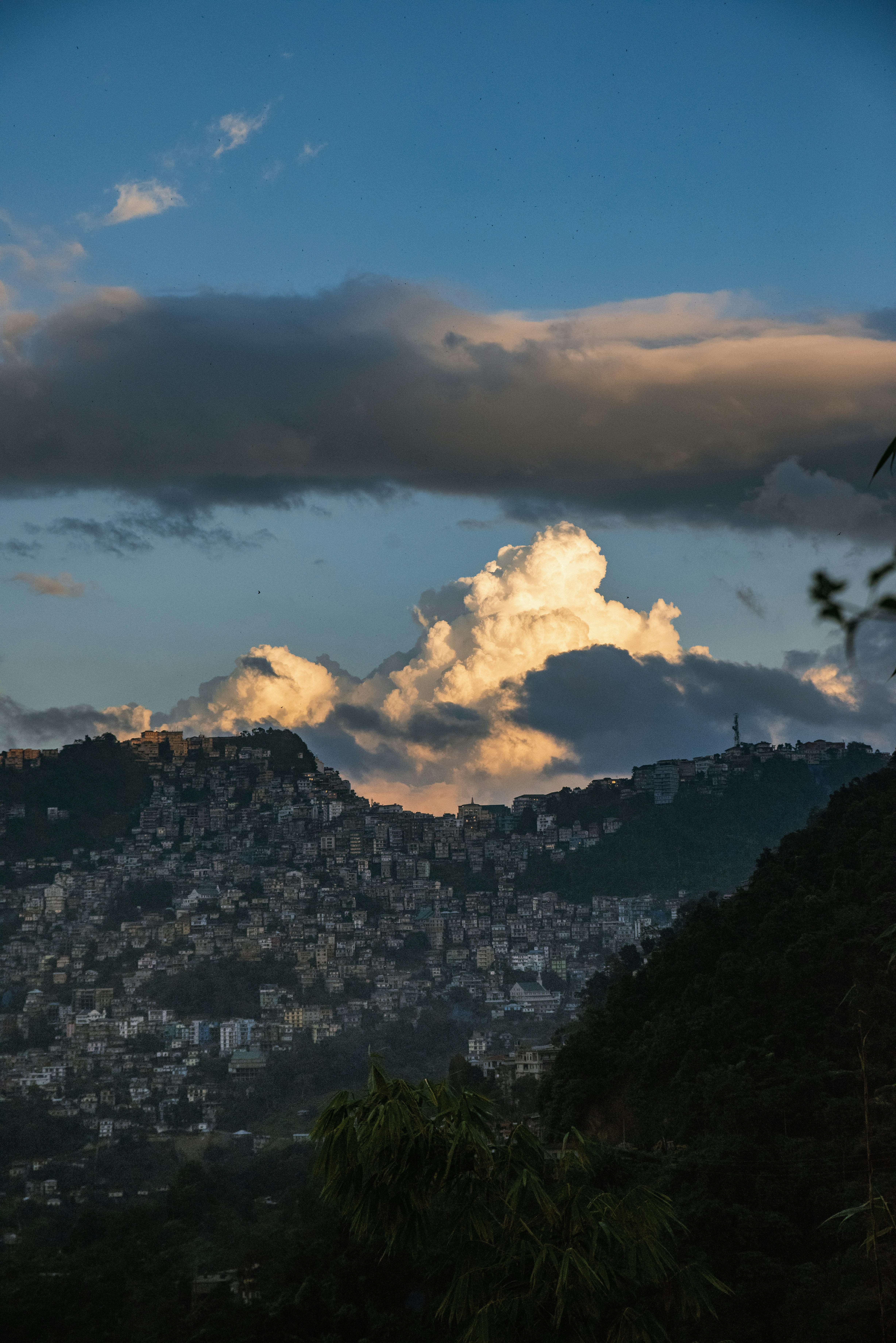 Golden Clouds Over Hillside Dwellings