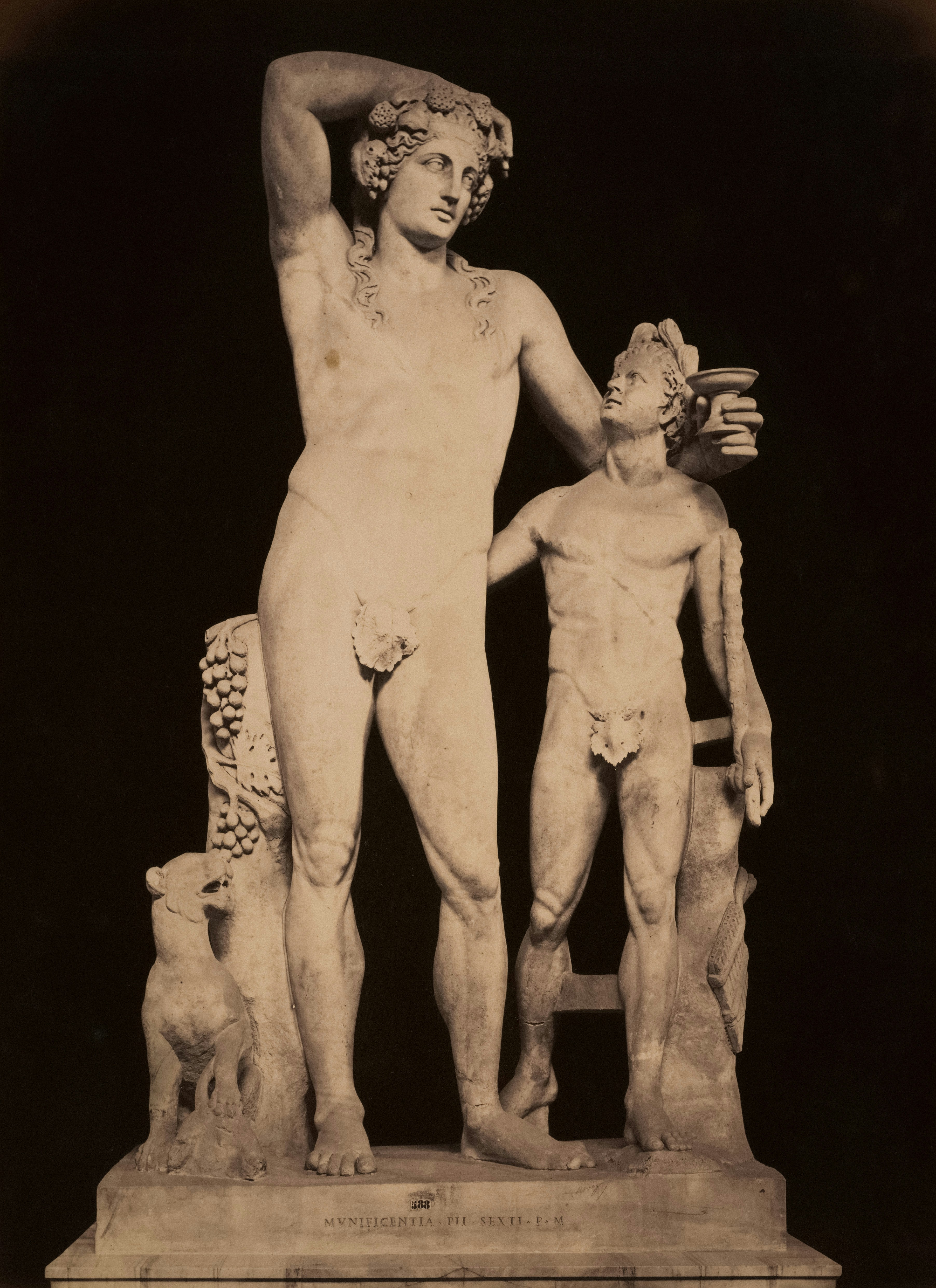 A marble statue of bacchus and ampelos. photo – Free Art Image on Unsplash