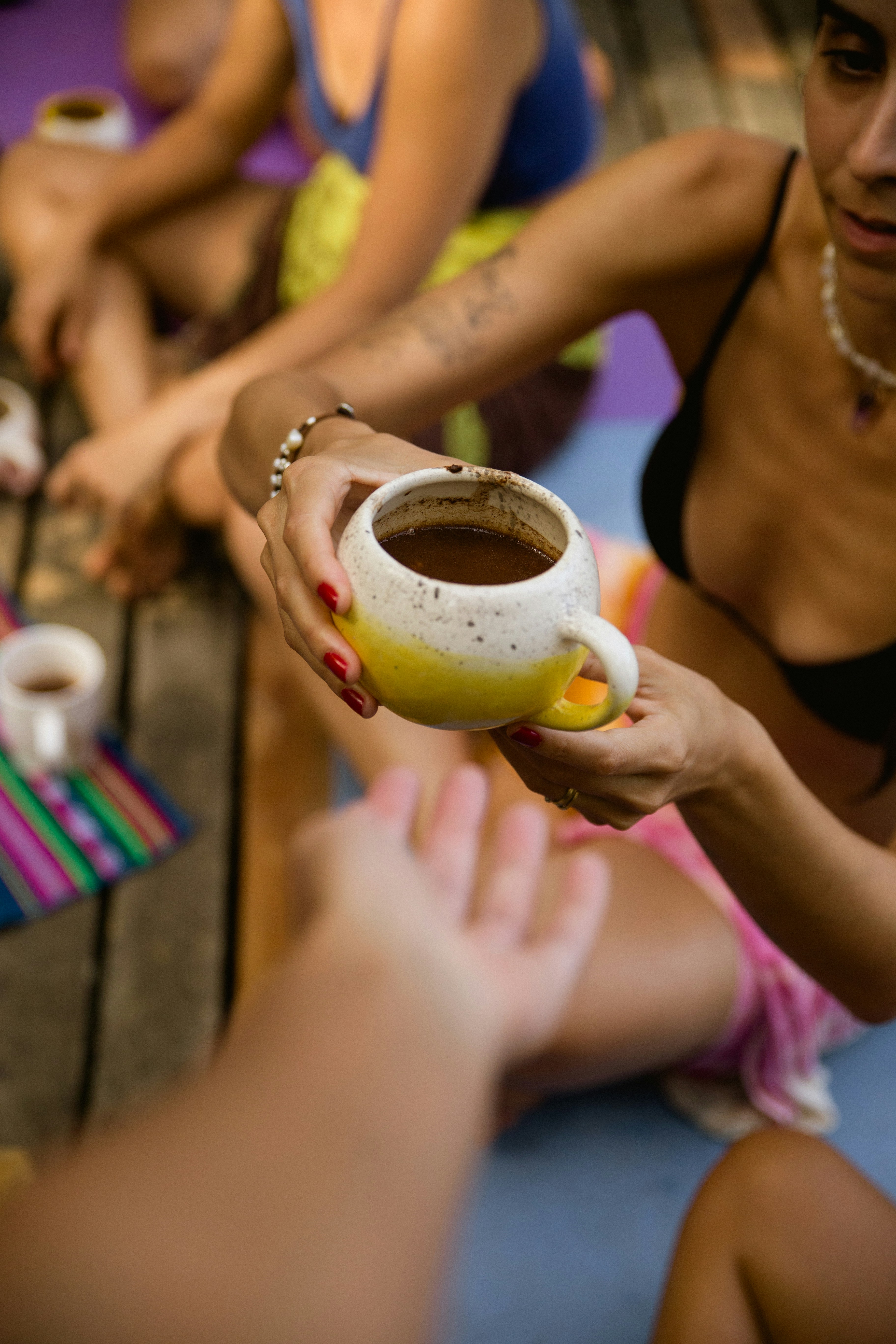 Shared Brew: Hands, Cup, and Moment