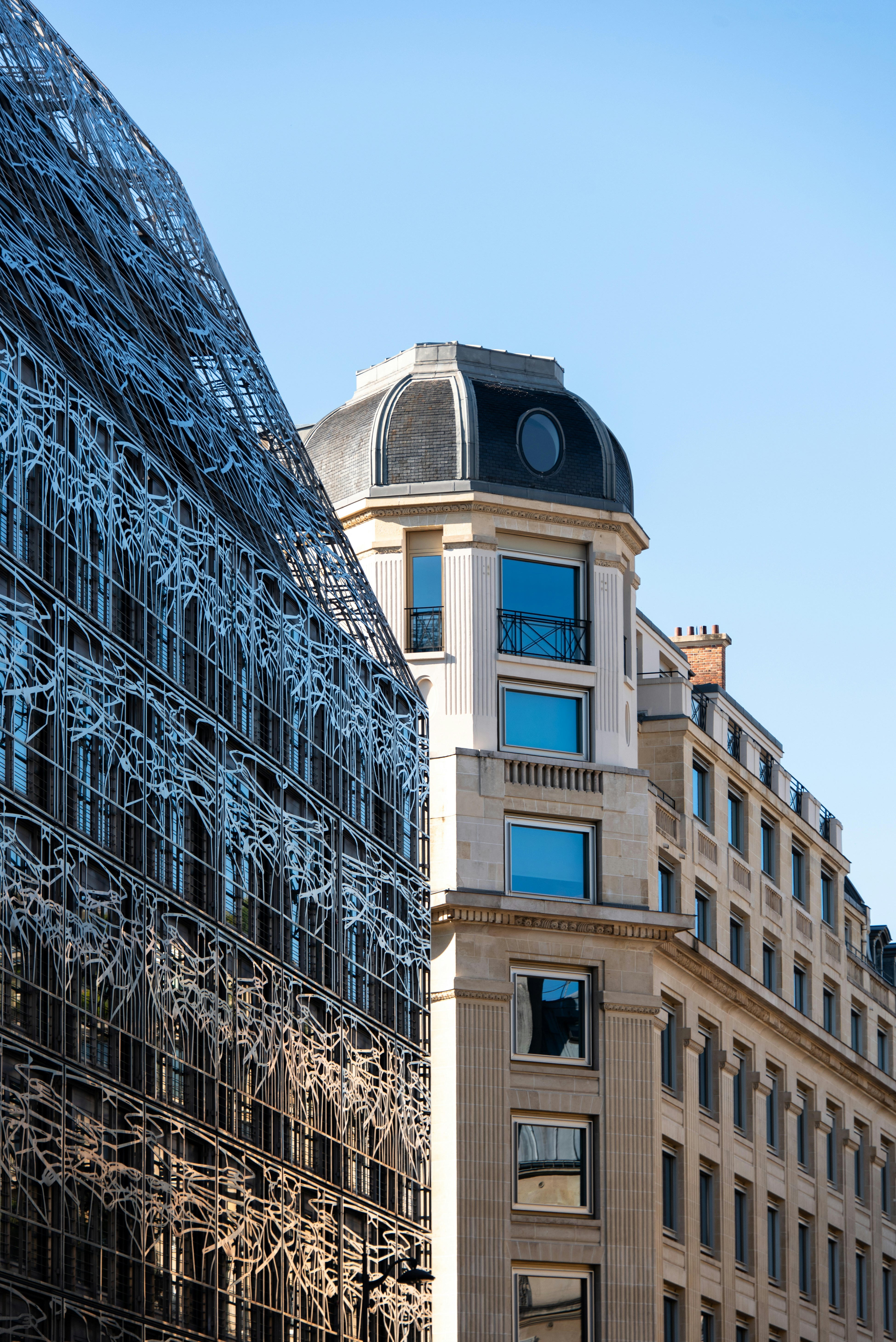 Modern and classic buildings stand against a clear sky. photo – Free ...