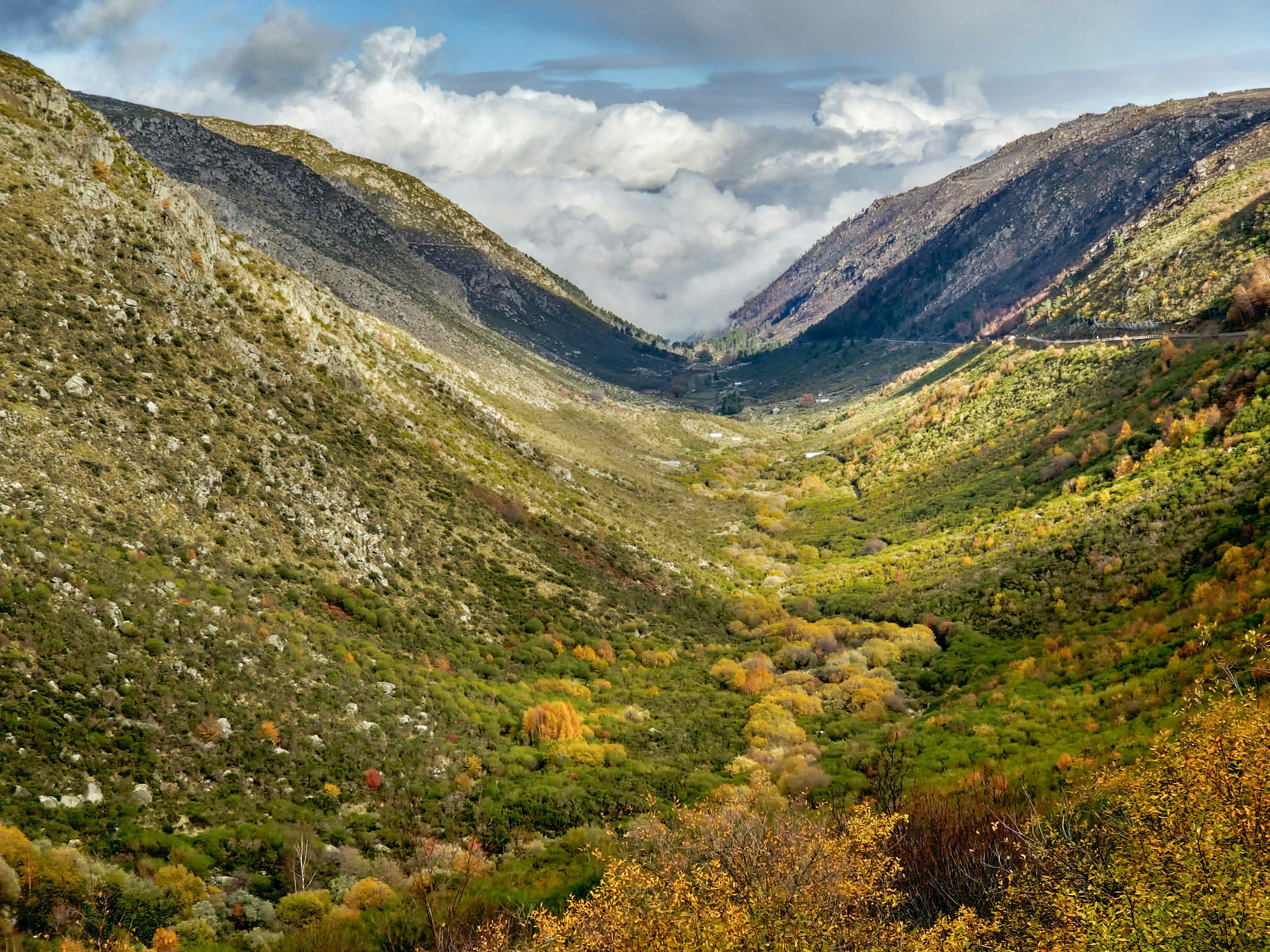 A scenic valley stretches between two mountains. photo – Free Forest ...